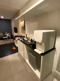 First time seeing a water cooler / hot water dispenser in a room