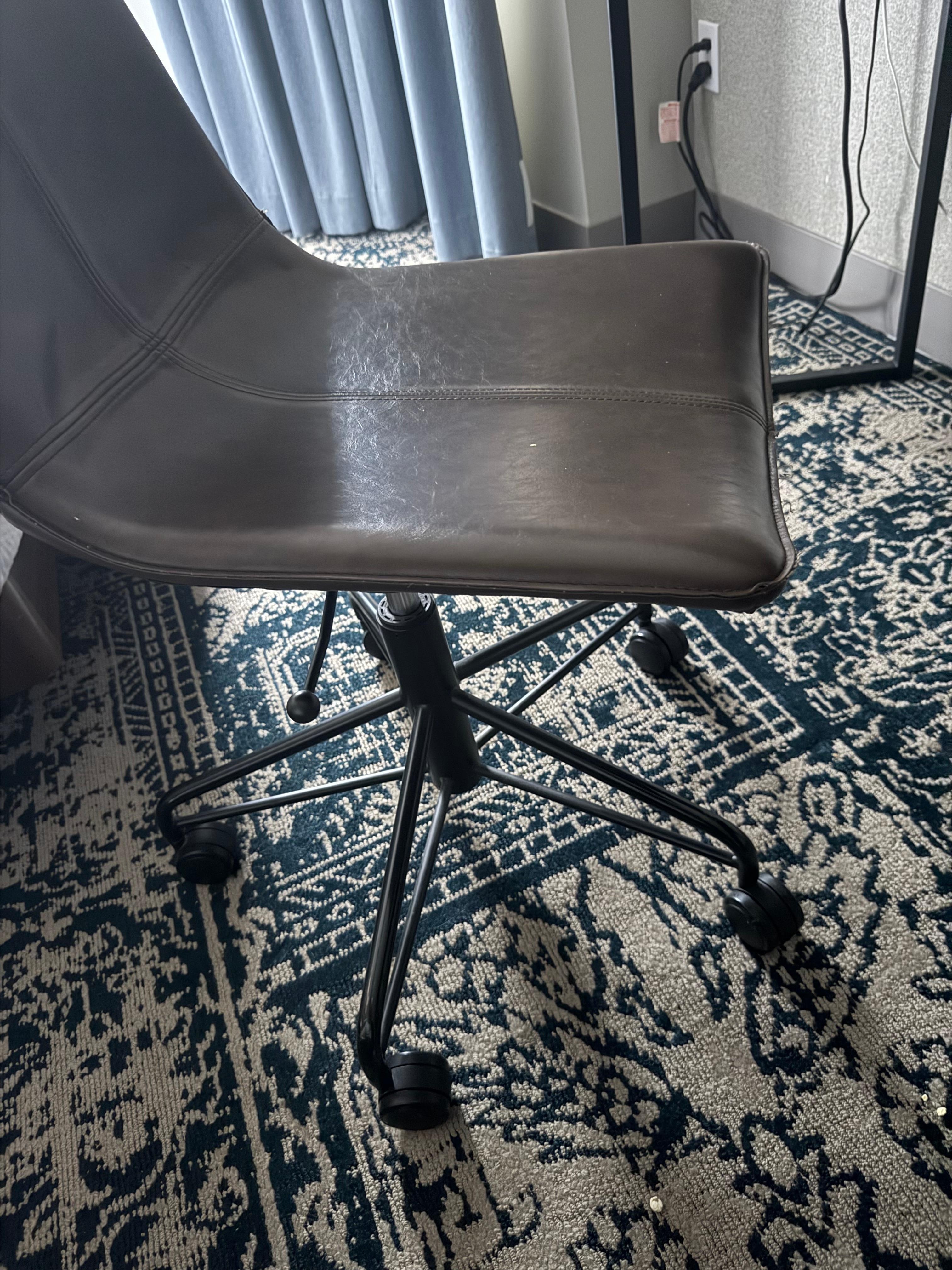 chair was broken you cannot see very well here but if you sat on it the chair would force you forward and was very uncomfortable.