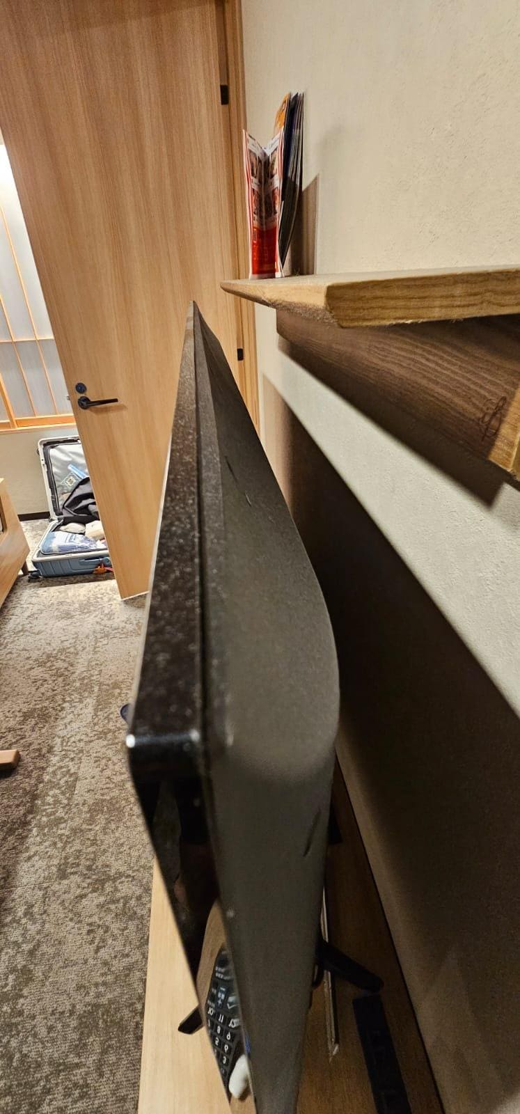 Dust/dirt can also be spotted on the TV