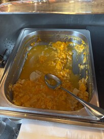 Patially cooked scrambled eggs