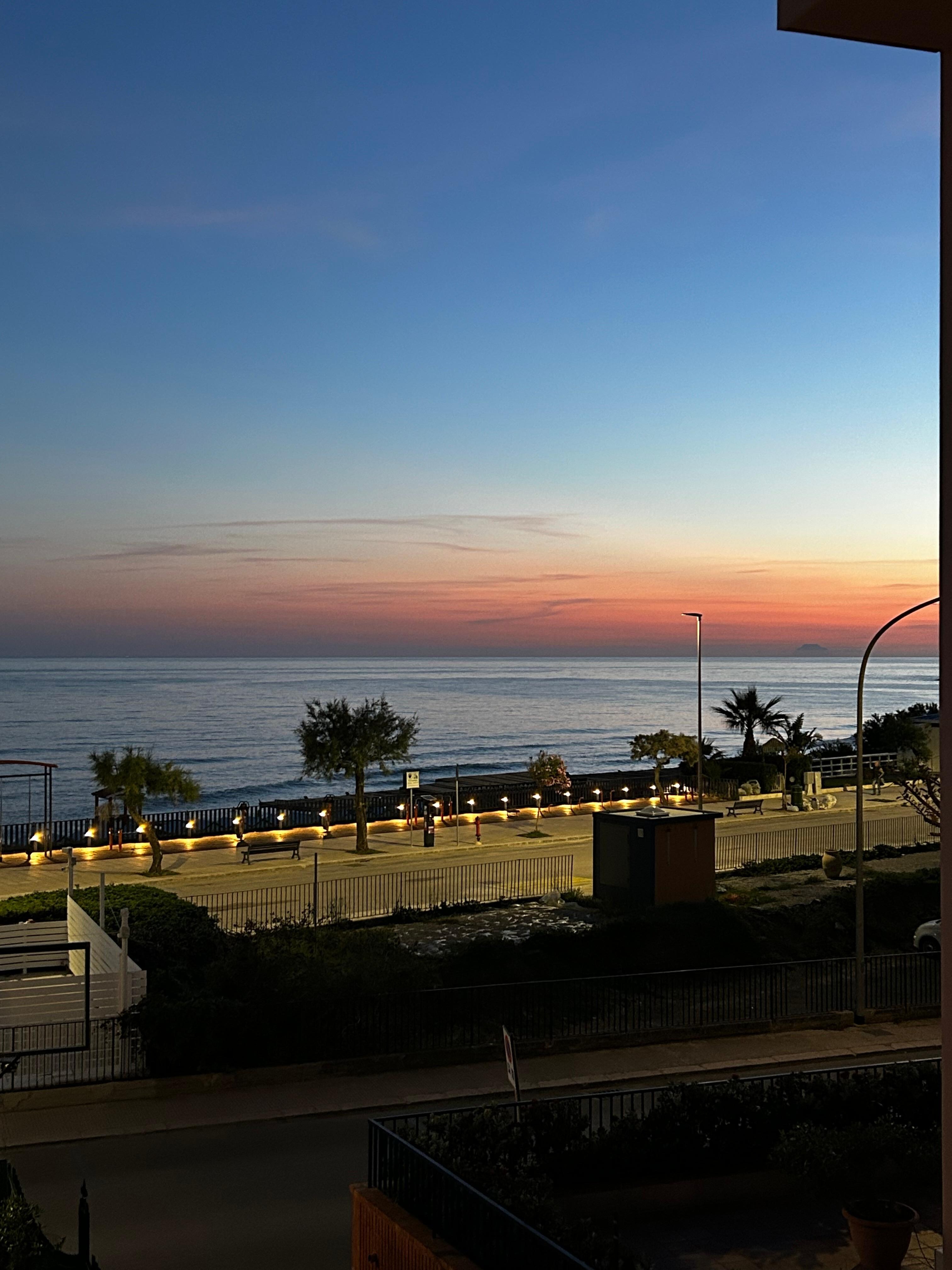 Sunrise view from the balcony of my hotel room 