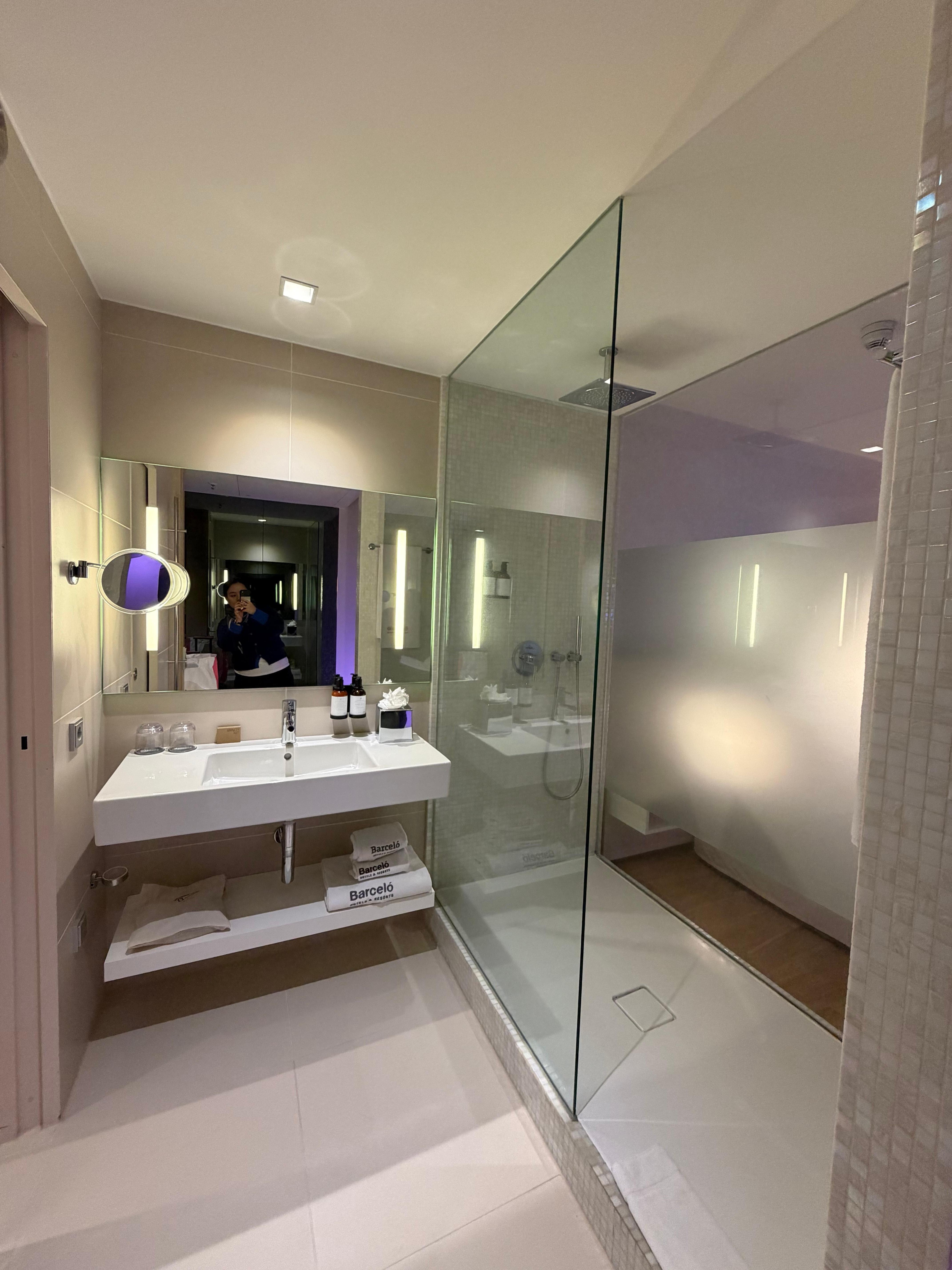 washroom with shower booth