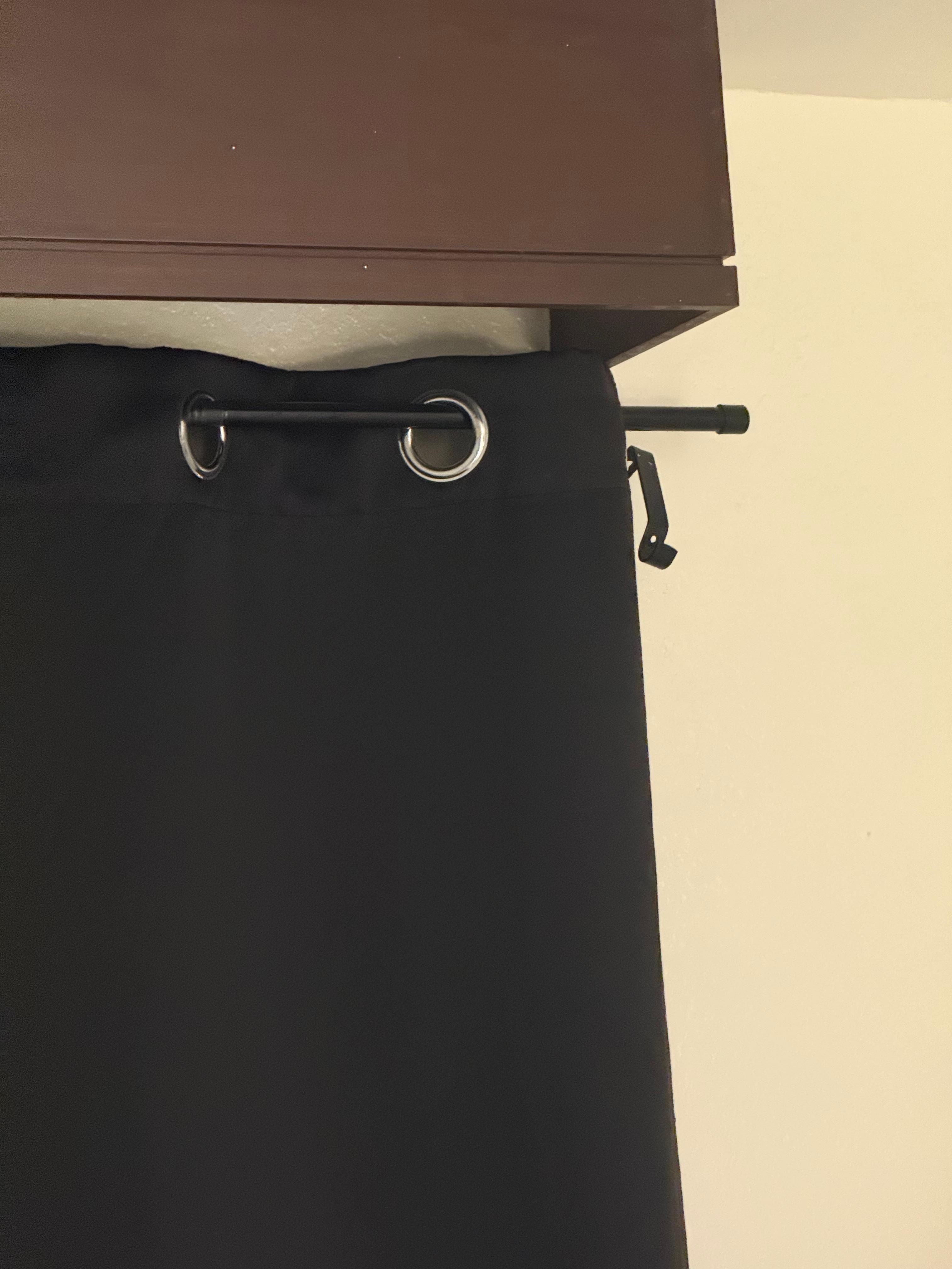 Curtain randomly  fell due to bad screws 