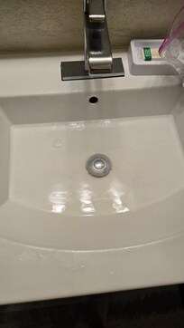 Sink was clogged, barely draining. Gross.