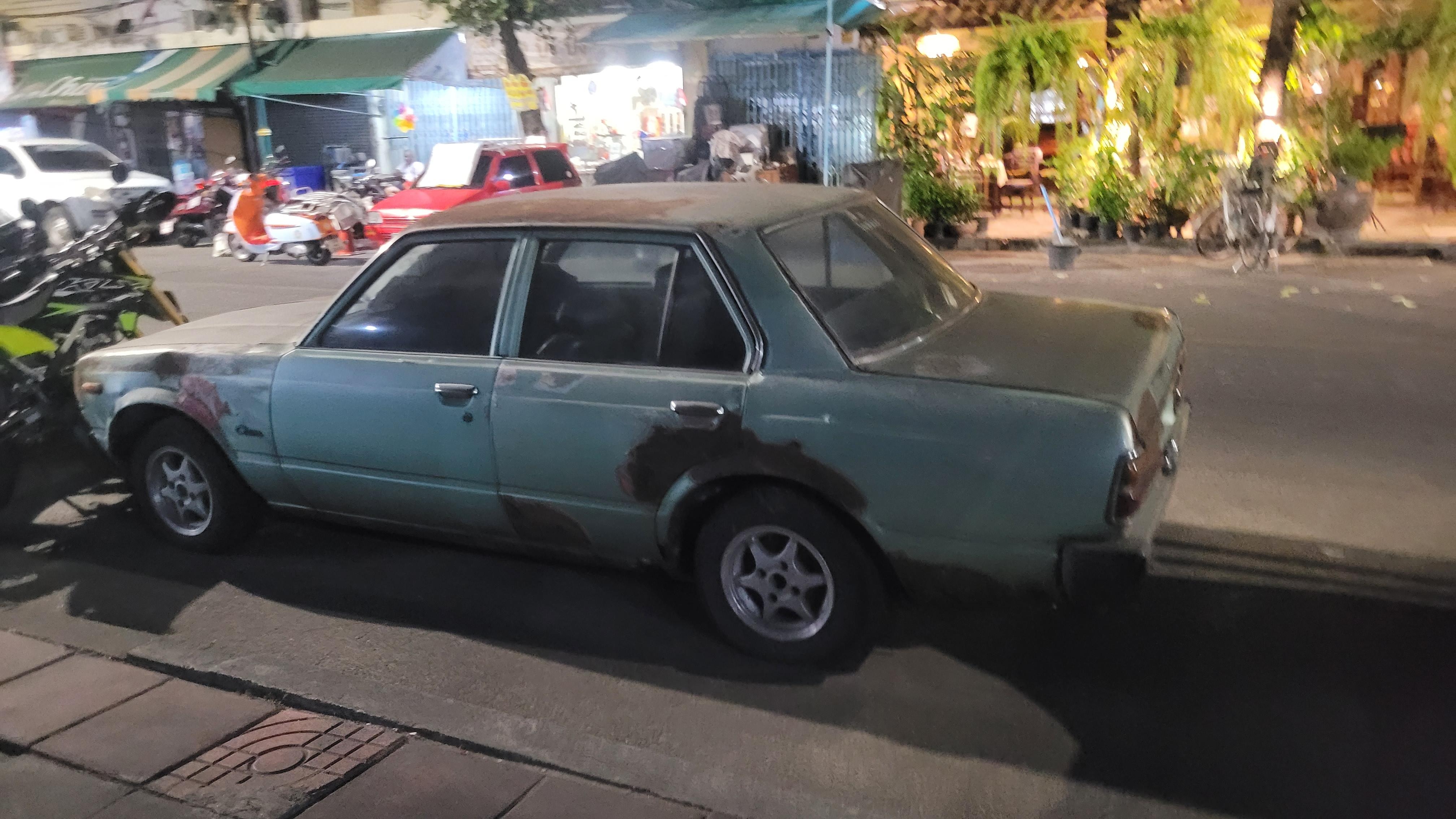 Hoopdy with hotel behind it