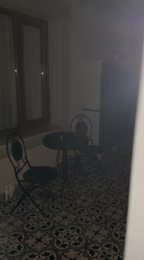 Raining outside the view from the door!