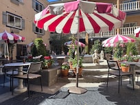 Le Chateau Garden Bistro courtyard