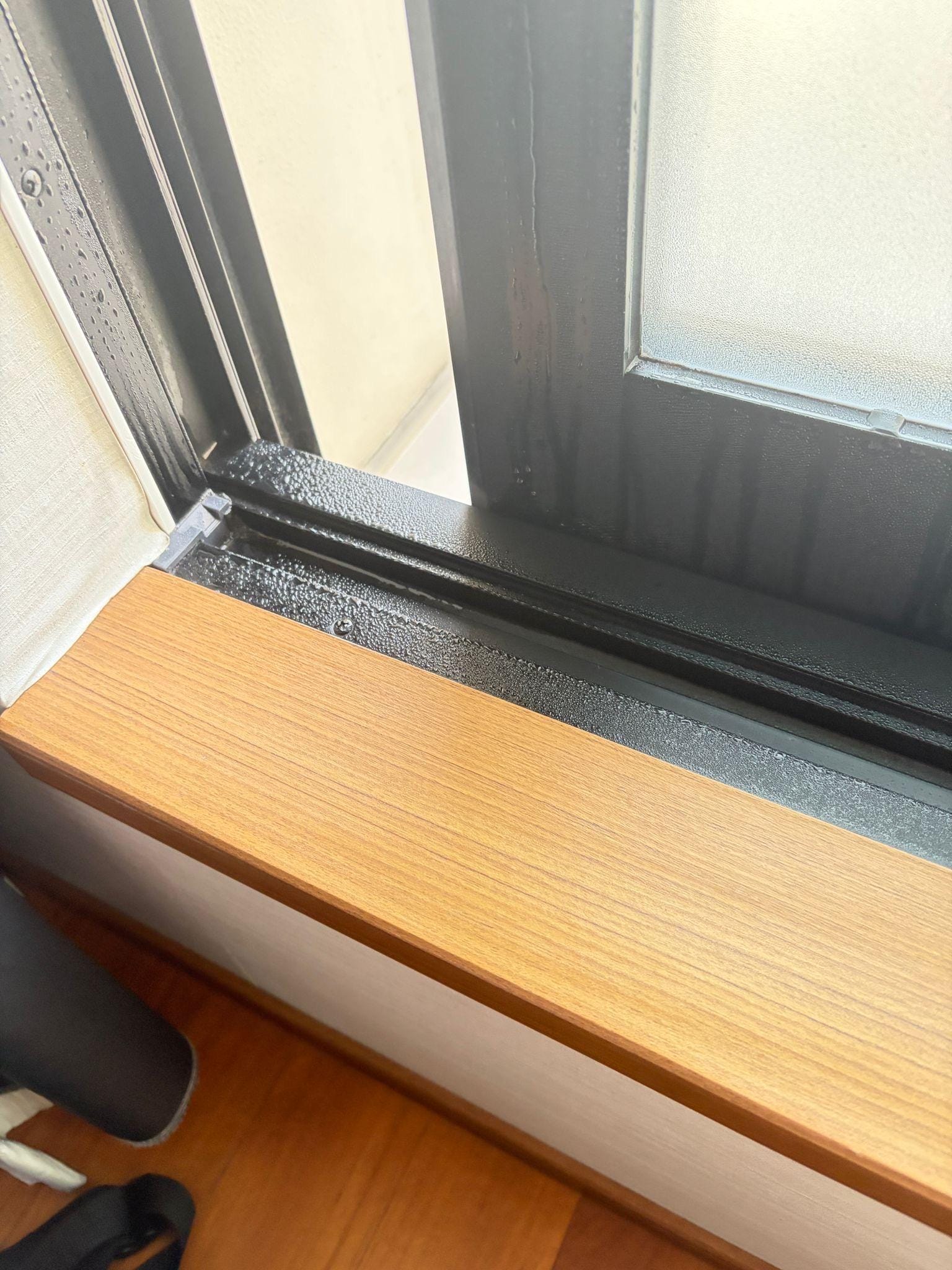 Condensation running down glass 