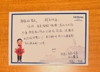 The room service staff thoughtfully left a warm, personal message after tidying the room.