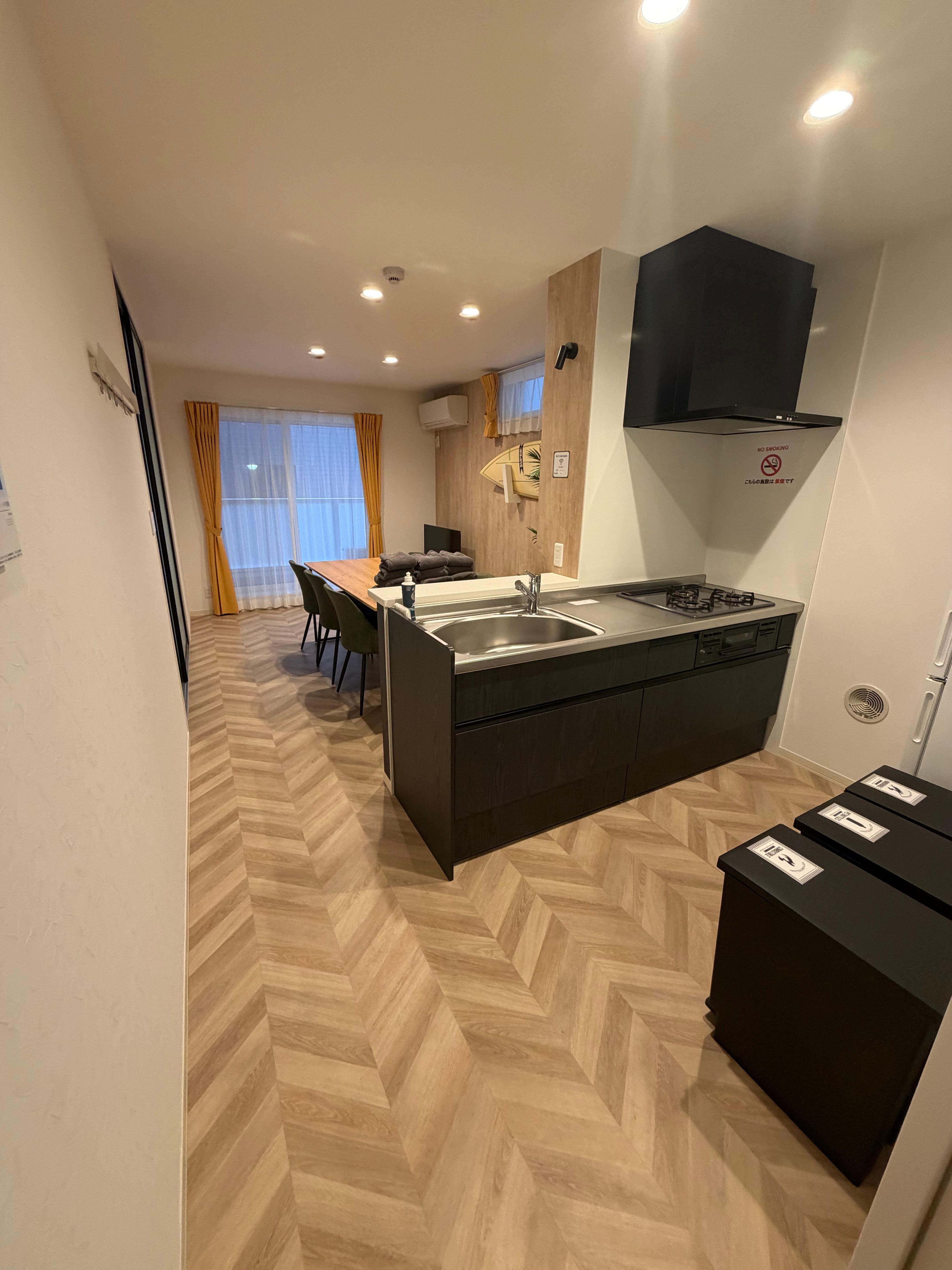 Kitchen and dining (fridge is in front of cooking area)