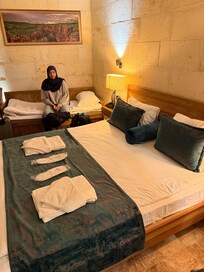 Beds, slippers, robes and towels ready to go. She wanted to sleep on the warm floor!