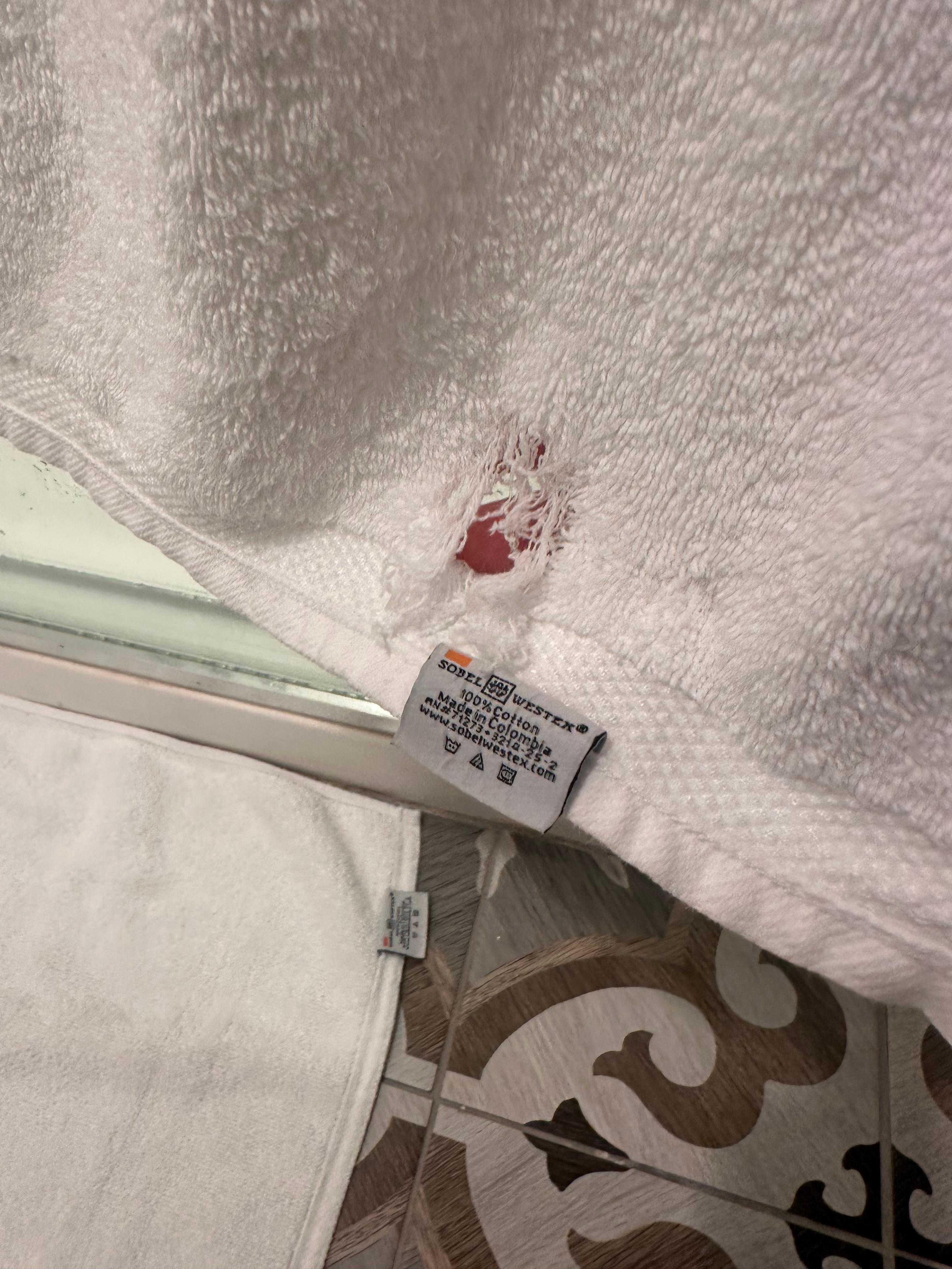 Hole I. Bathroom towels