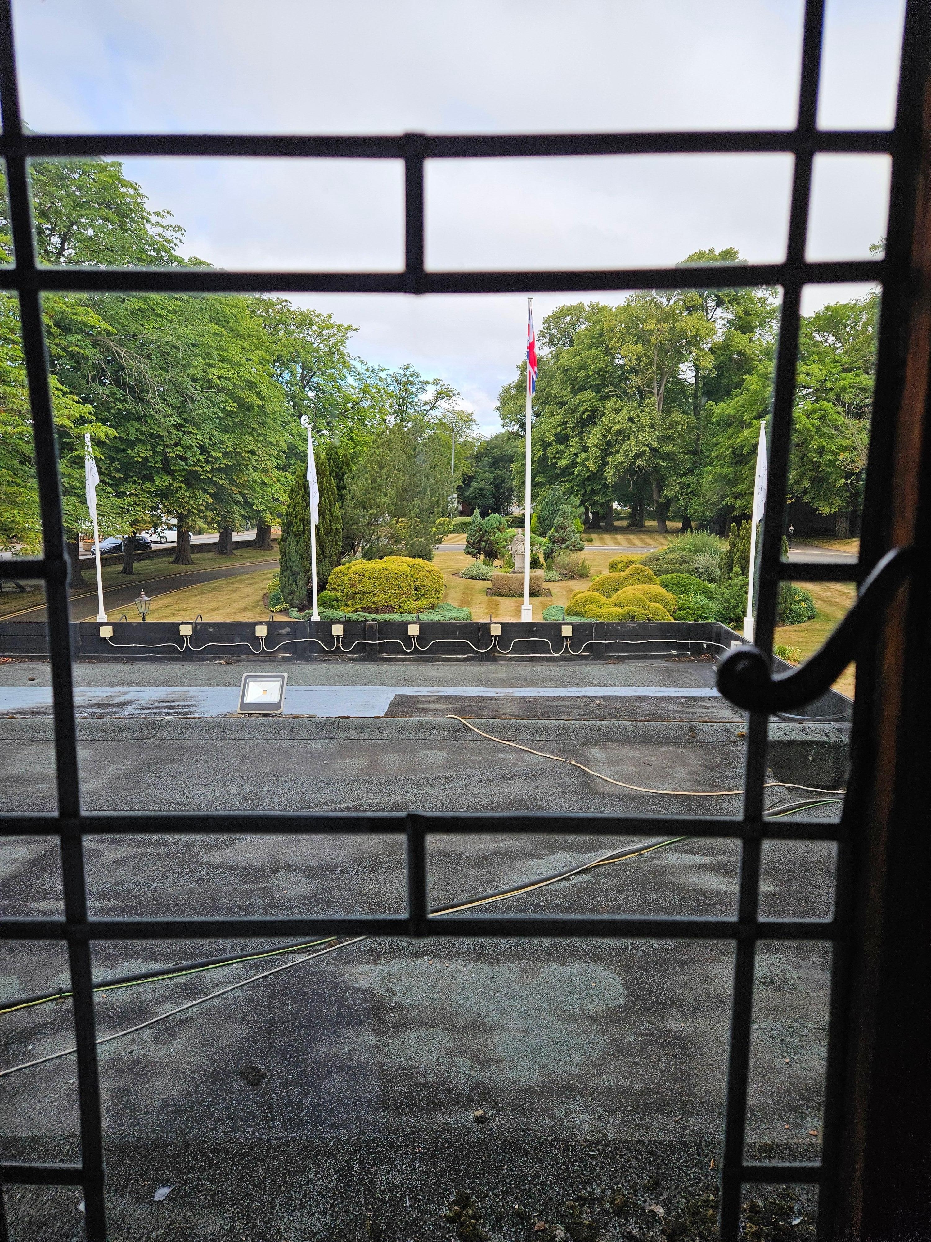 View from window: bitumen flat roof and wiring ...for a room that more than £300 per night !