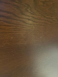 Marks that you could strap off with your finger nail