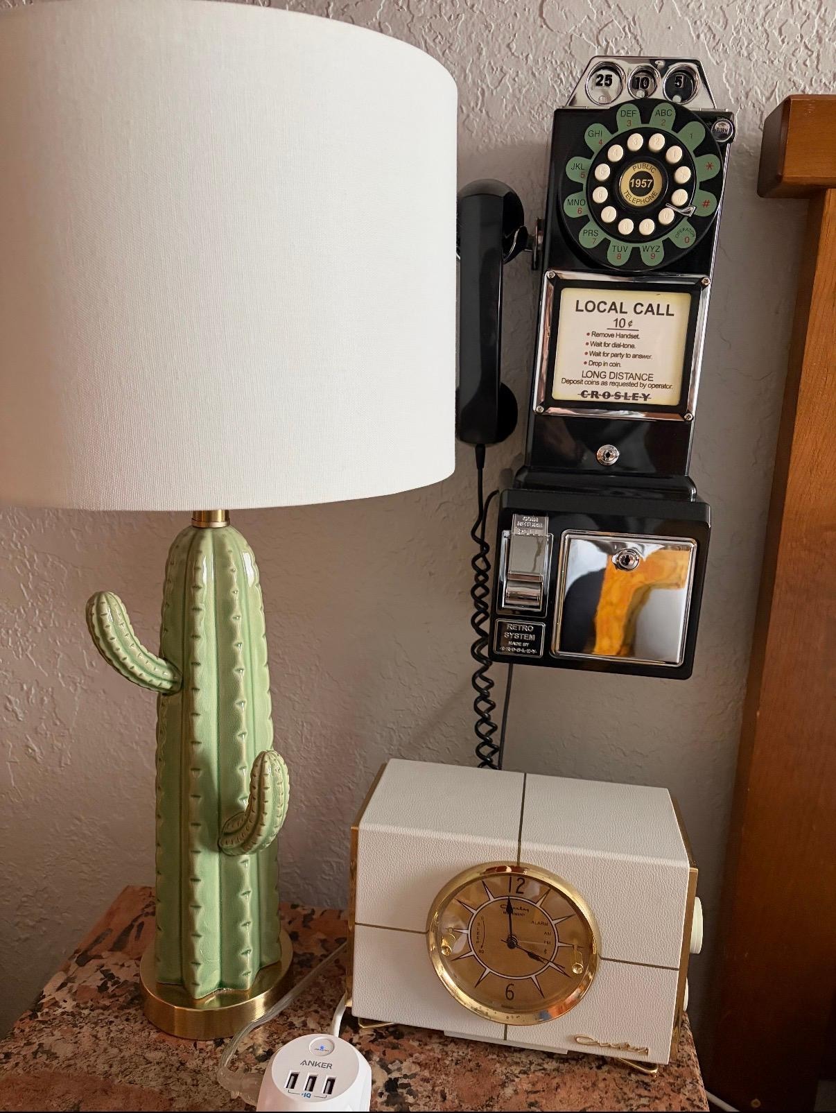 Wall phone & Cactus lamp. 