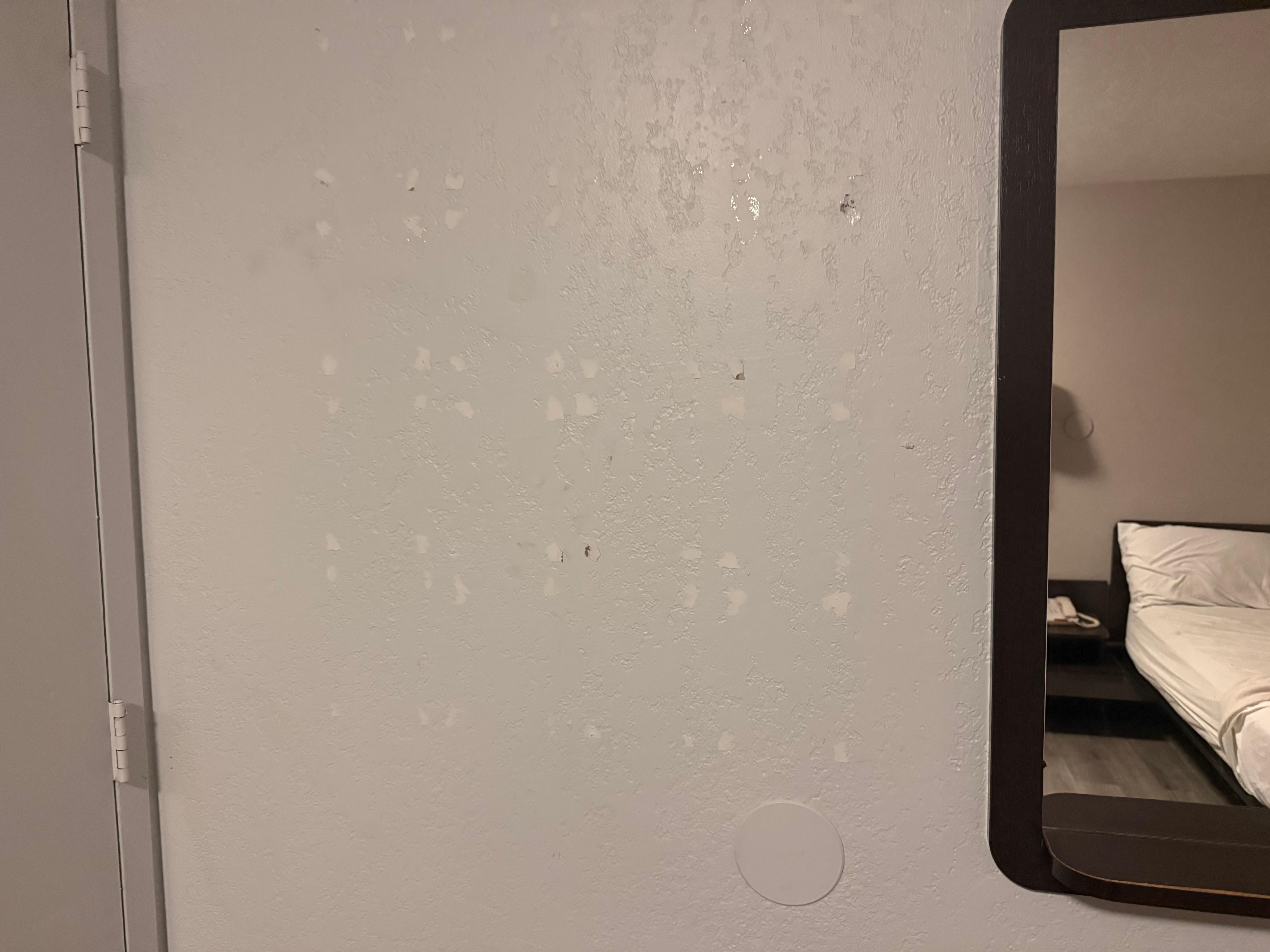 Deplorable walls along with the smell of drugs and no smoke detectors or functioning thermostat 