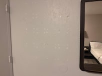 Deplorable walls along with the smell of drugs and no smoke detectors or functioning thermostat