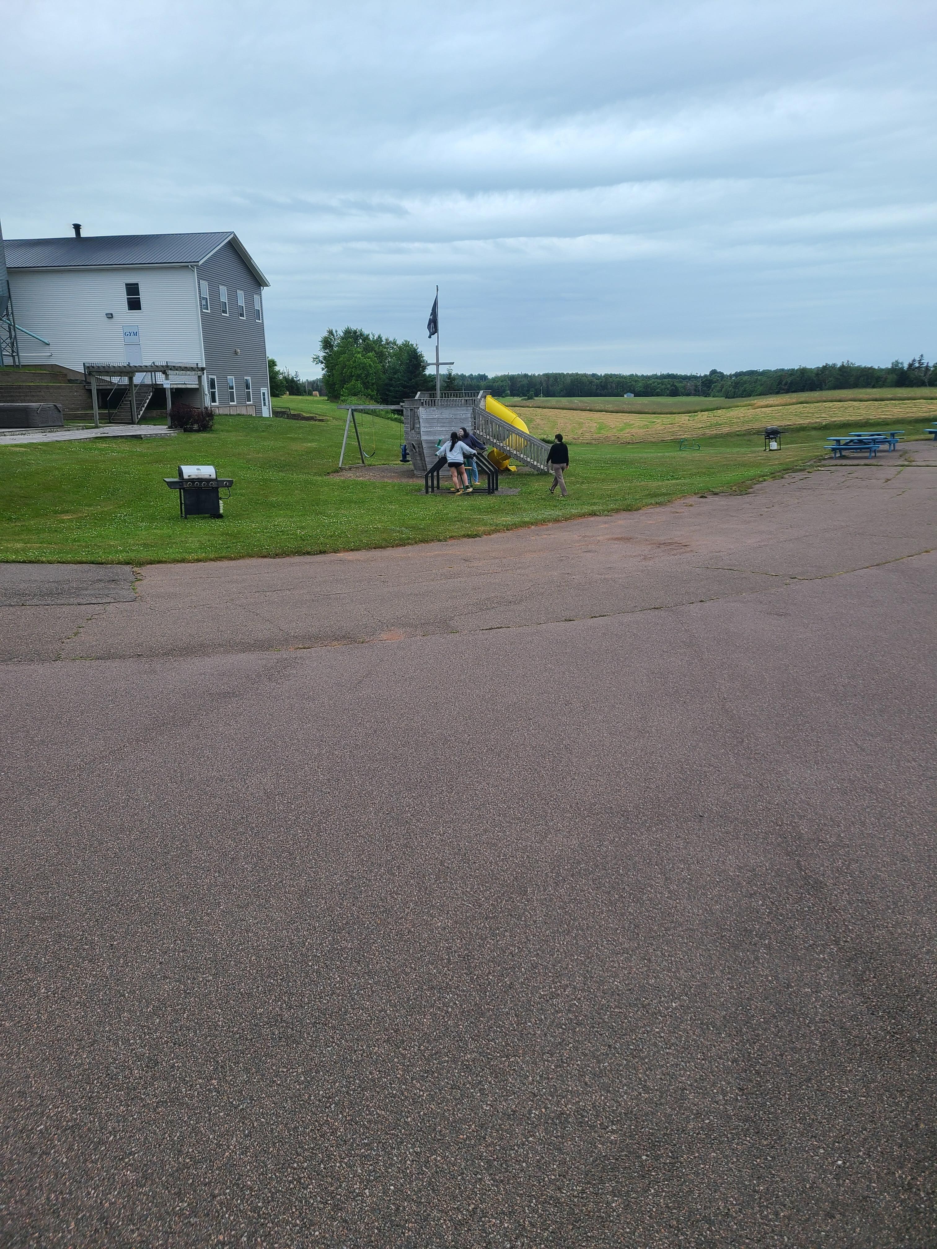 Outside of room, play structure and excercise equipment