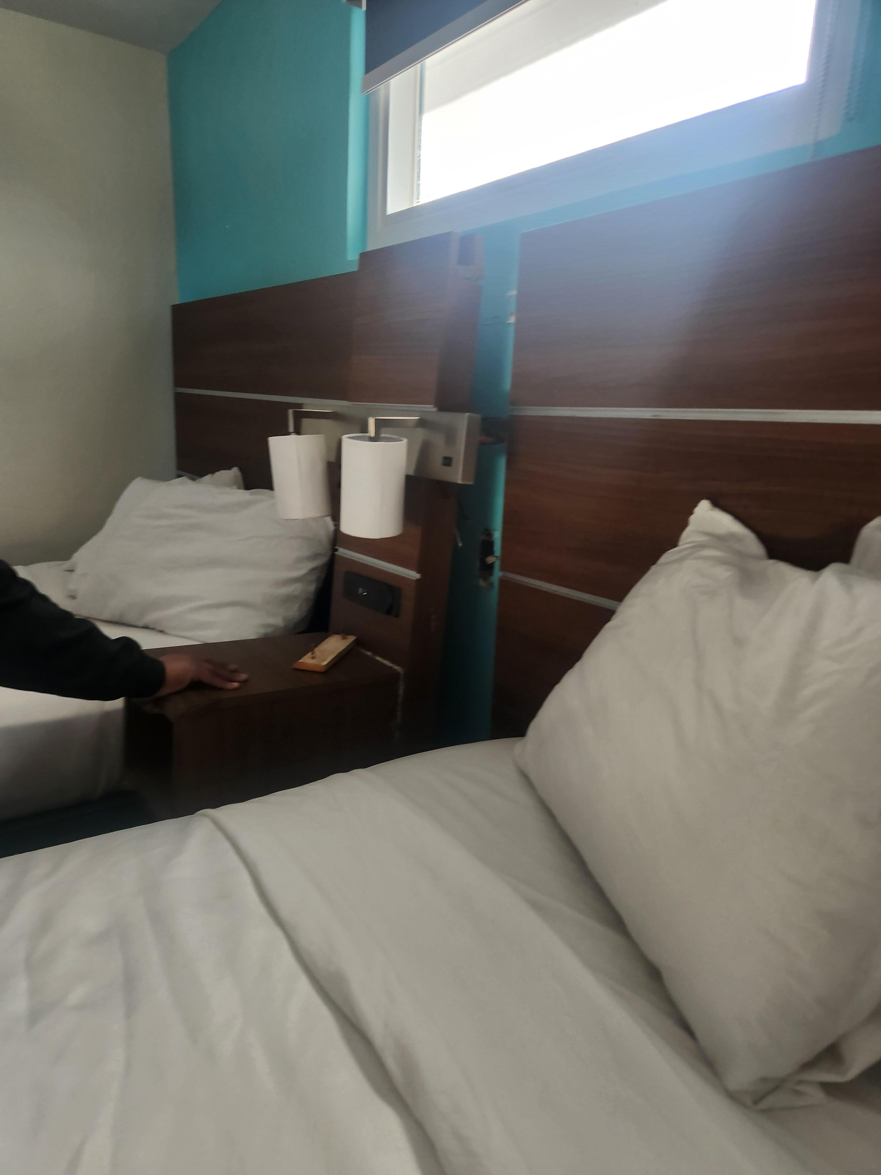 The stand in between the beds fell asleep soon as we walked through the door 