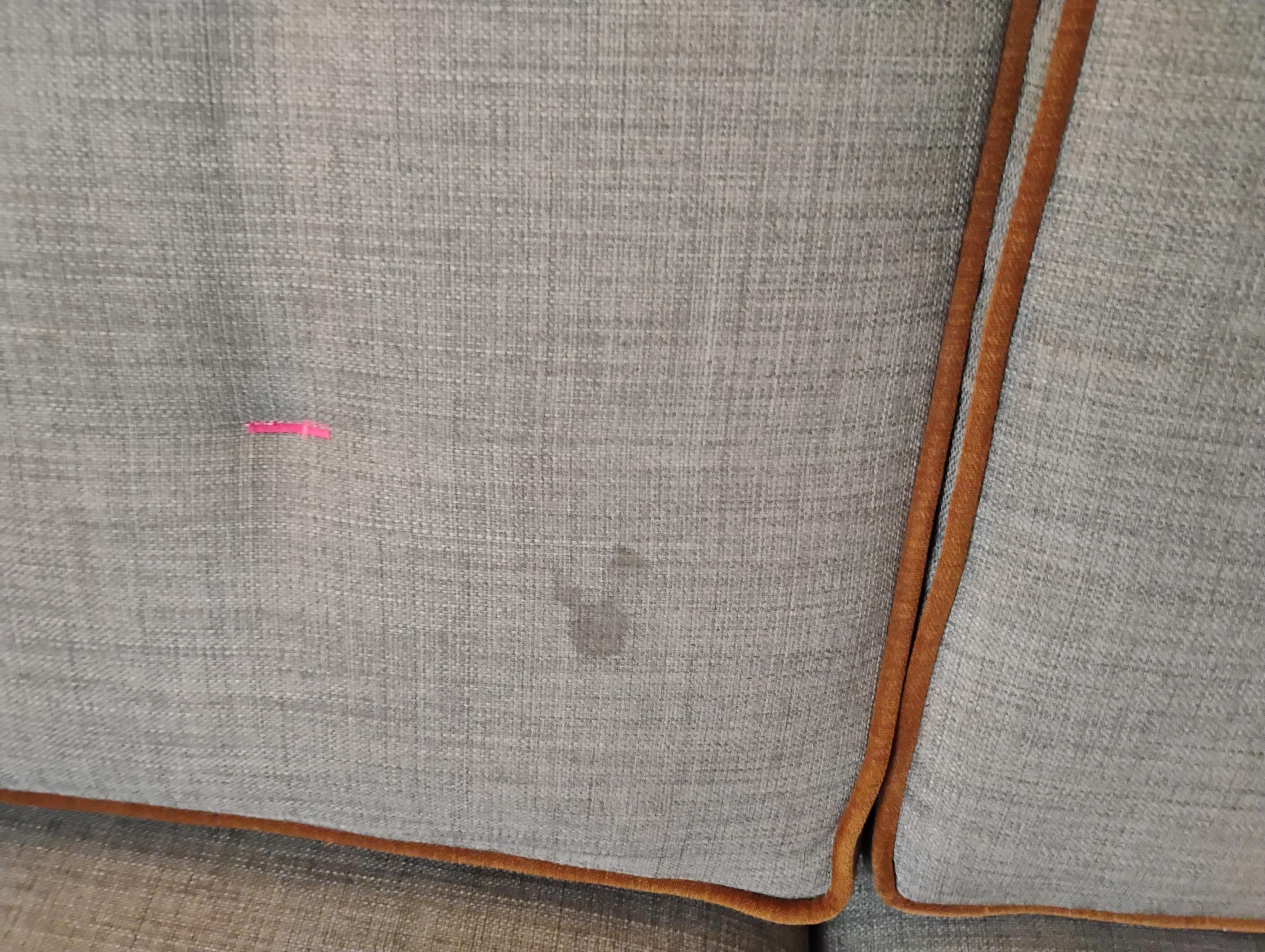 Soiled pillows on sofa 