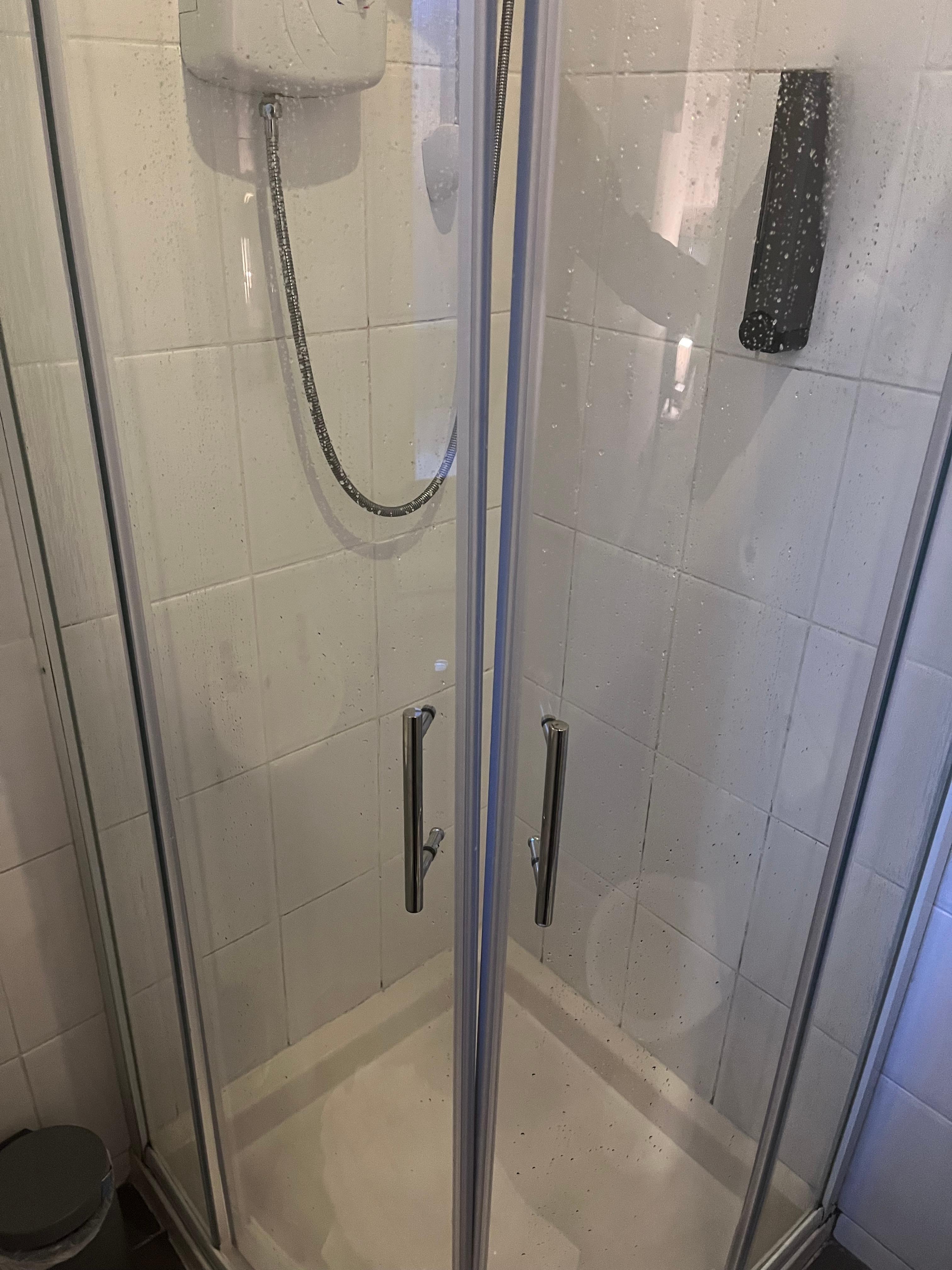 Shower door didn’t close allowing water to cover the floor