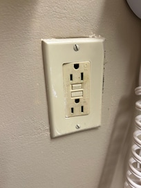 The outlet did not look safe at all