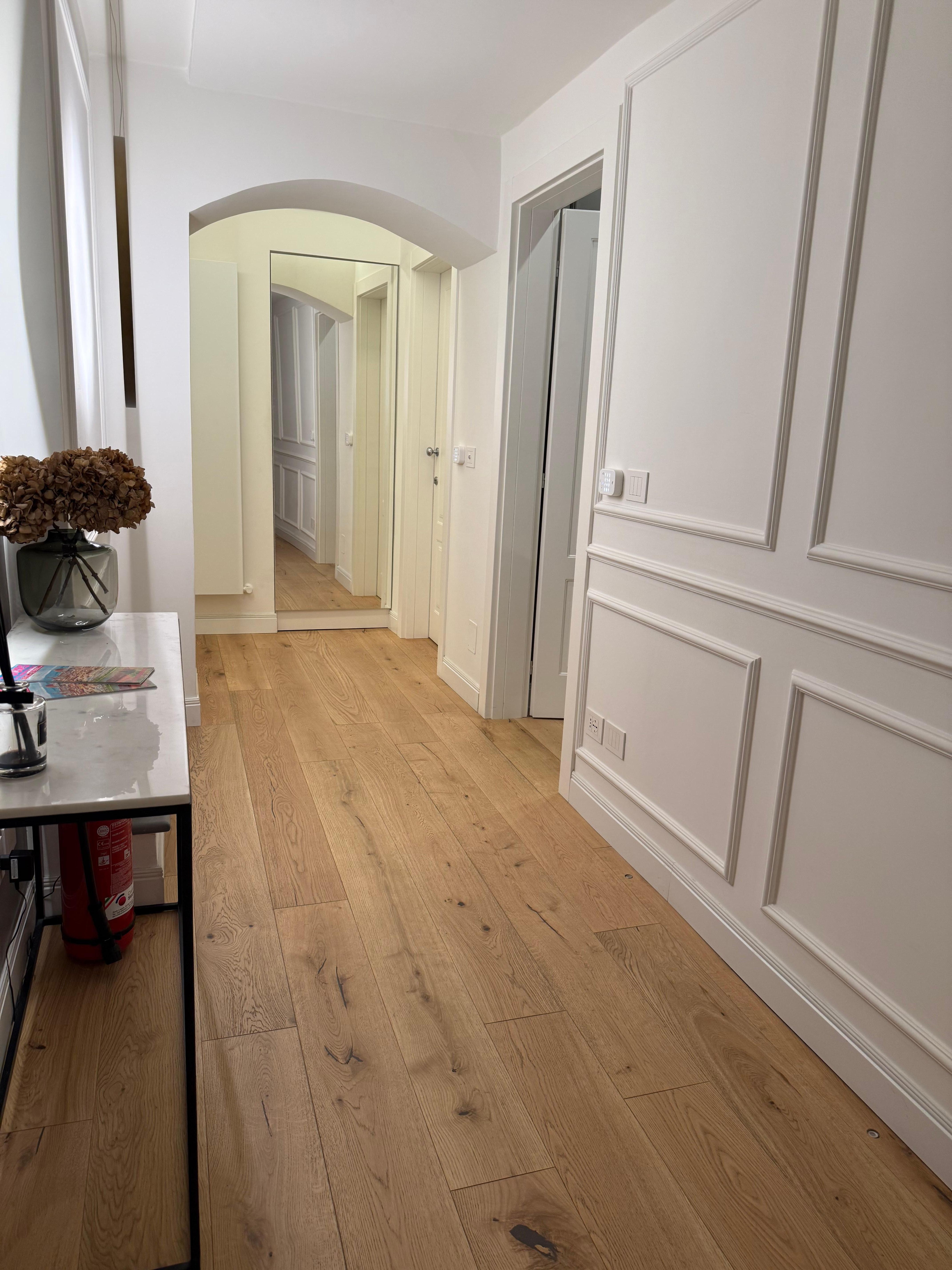 The flat hallway to the rooms