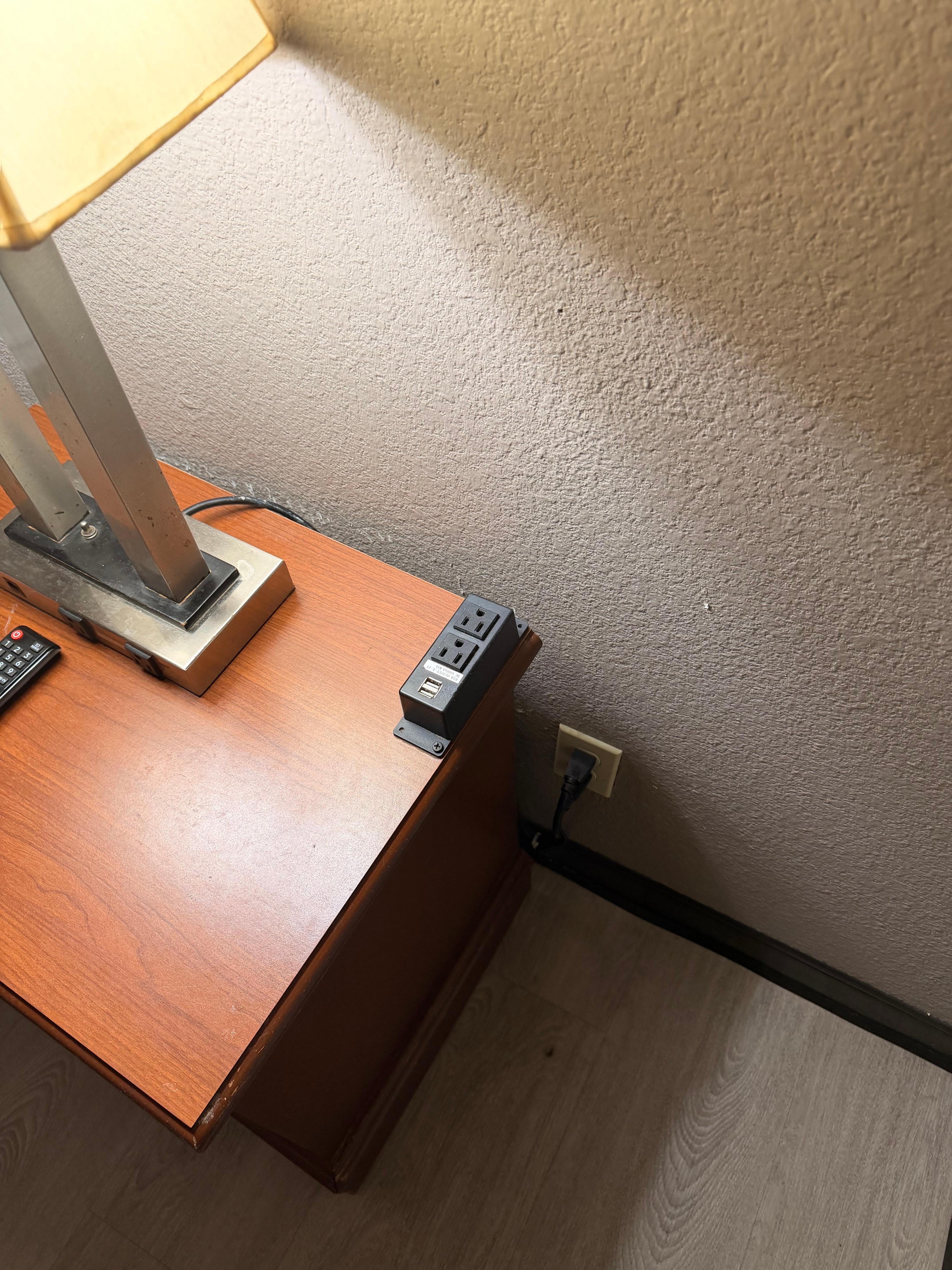 USB hub just super glued to the table, fire hazard. 