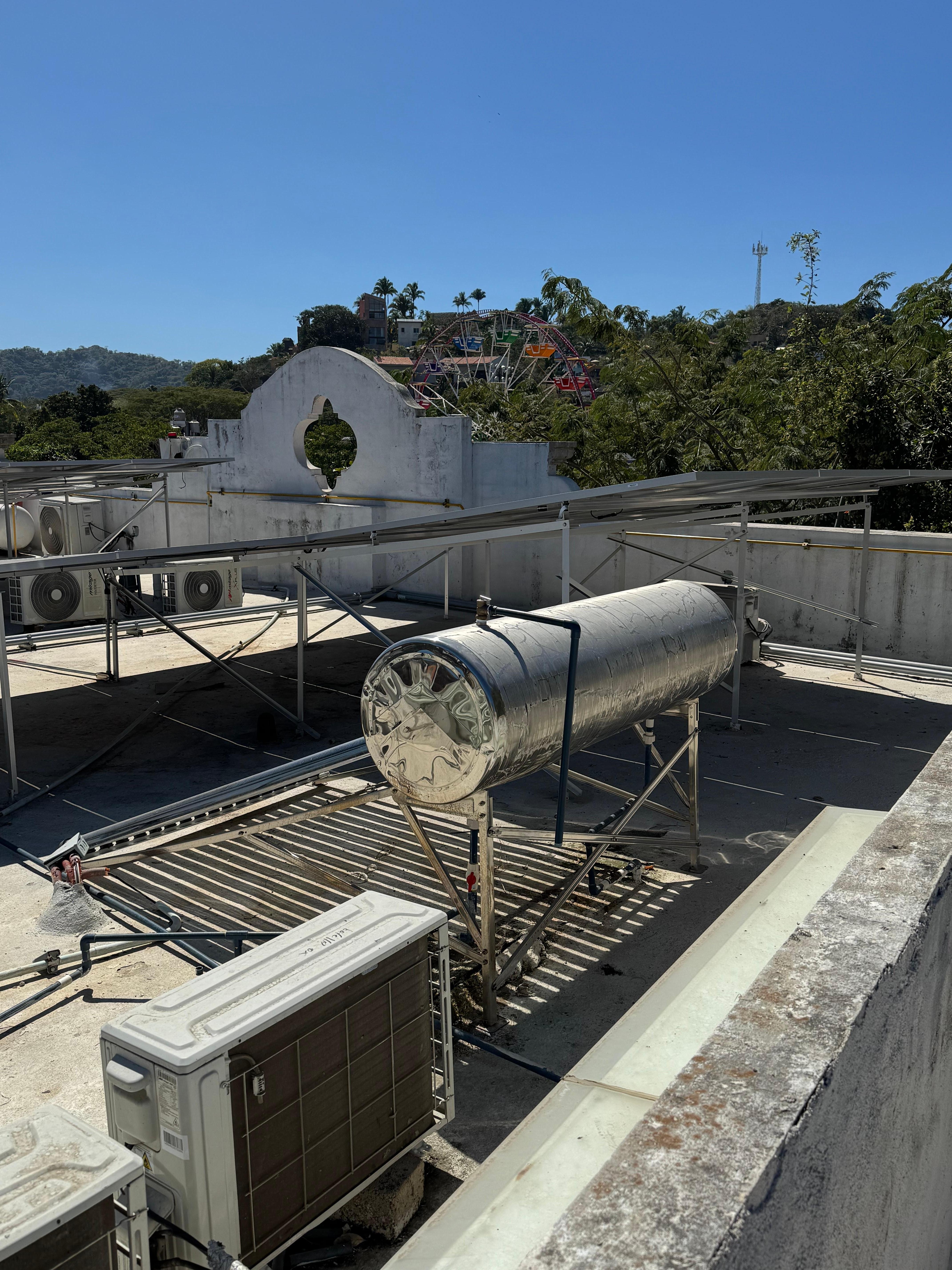 The hot water is solar. During my 4 night stay I never even had a warm shower. I had a room temperature shower. I brought this issue up to the front desk, maintenance and management. Solar only! The HOTELS.COM description does not mention this. 

