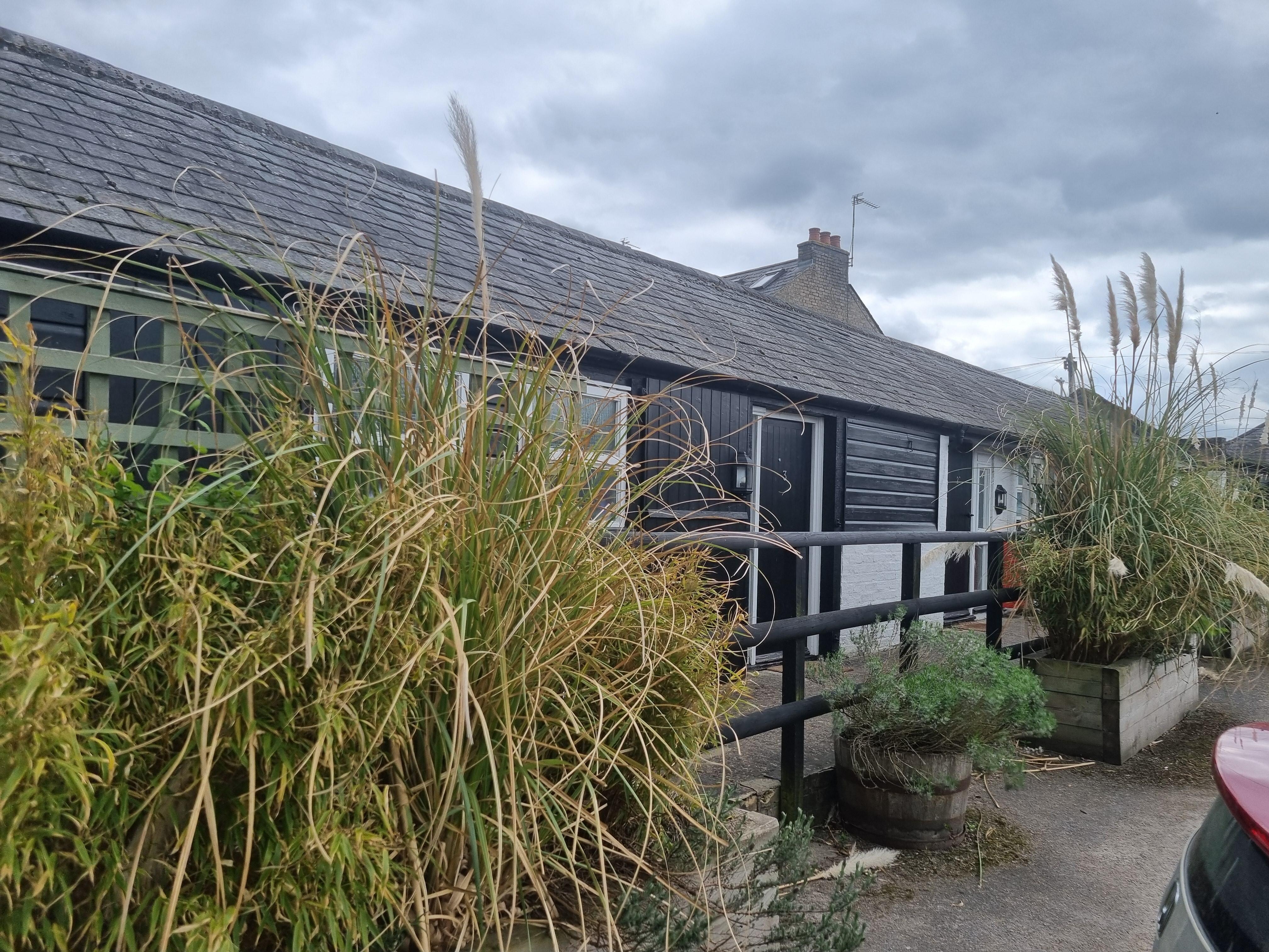 Row of approx 4 rooms like small chalets. Converted stables. Modern decoration.