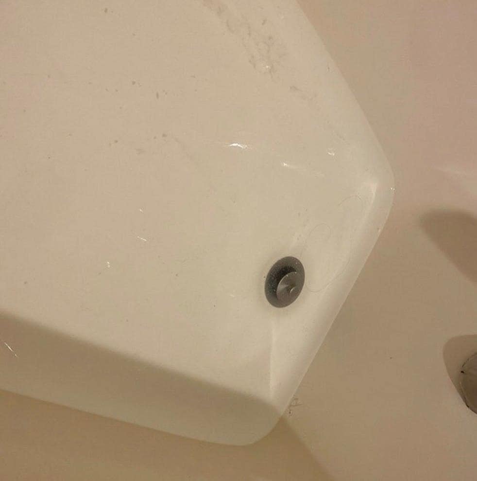 Yellow dirty bathtub