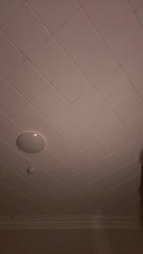 Polystyrene tiles on ceiling which I thought was illegal but they are a fire hazard