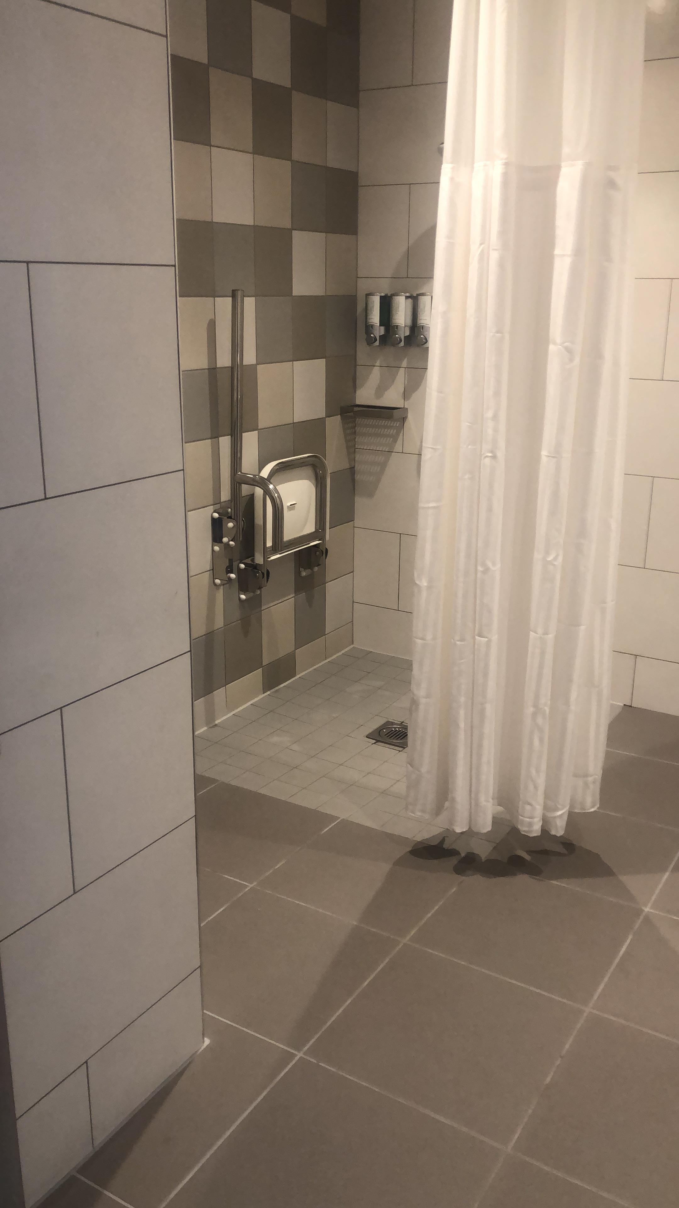 Shower with seat and ample hand rails