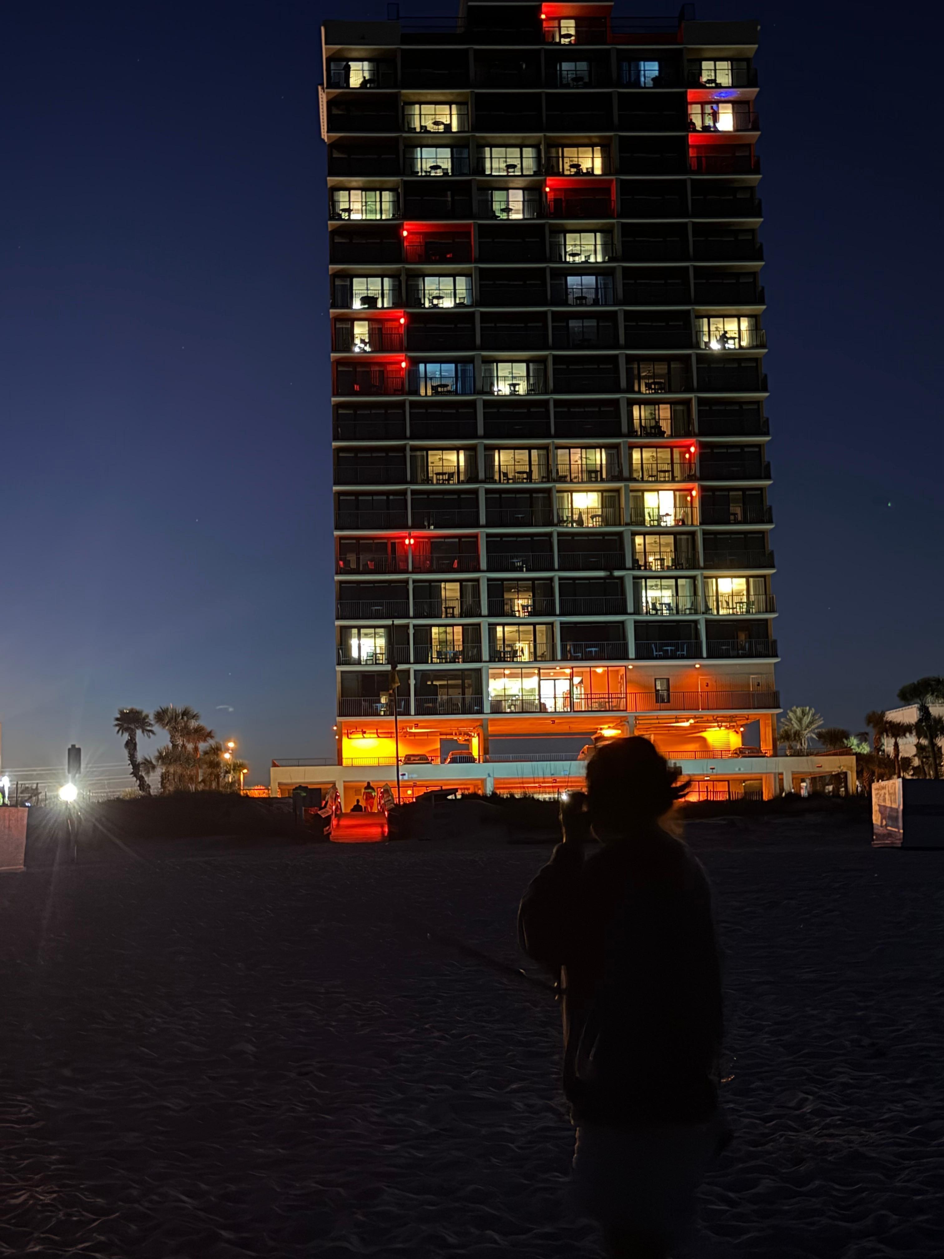 The Phoenix West hotel at night. 