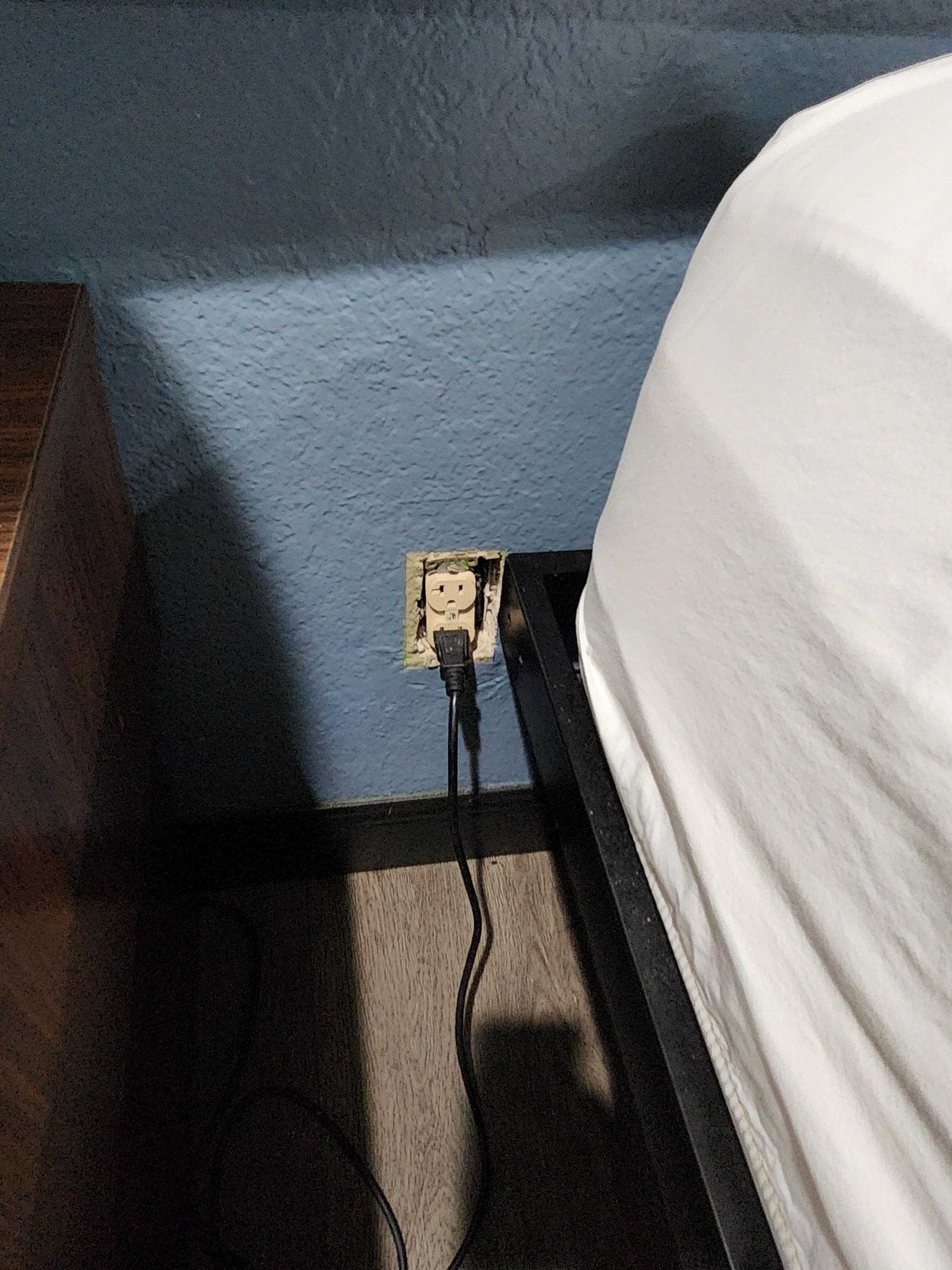 Outlet beside the bed