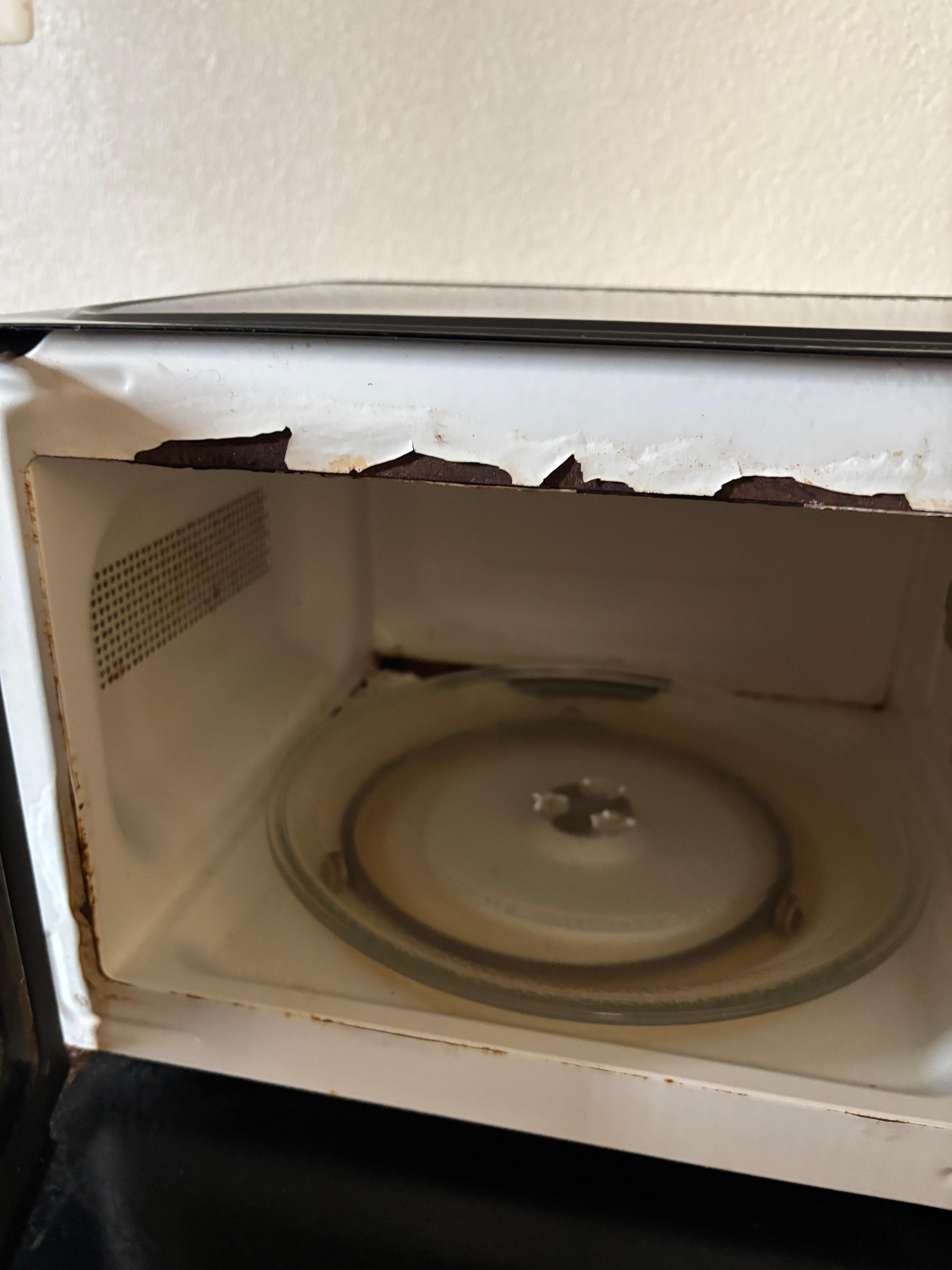Rusted, and dangerous to use microwave 