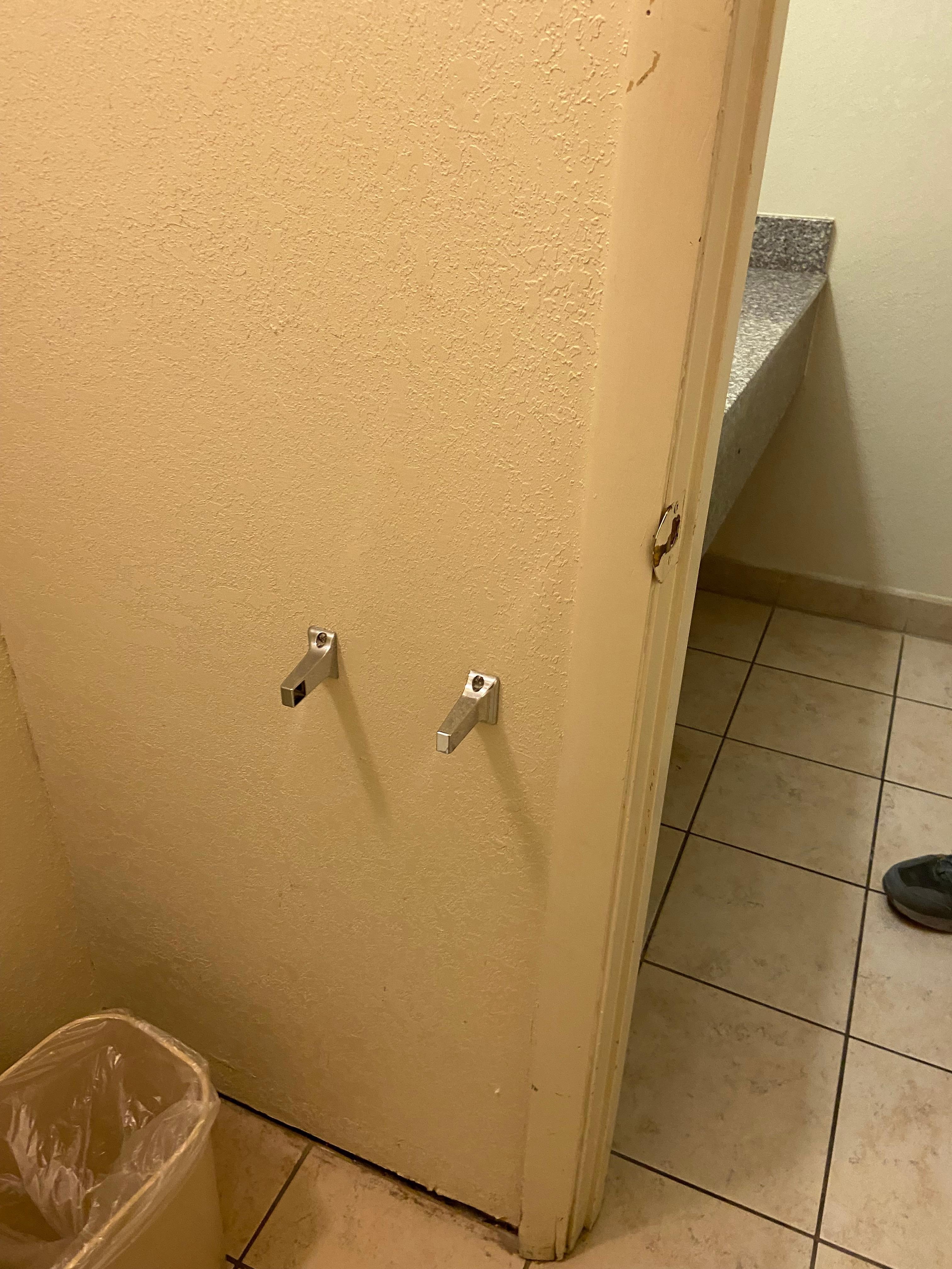 No toilet paper holder or toilet paper 
