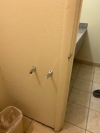No toilet paper holder or toilet paper