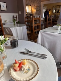 Yogurt with fruit, spinach quiche with black bean salsa, muffins warm from the oven!