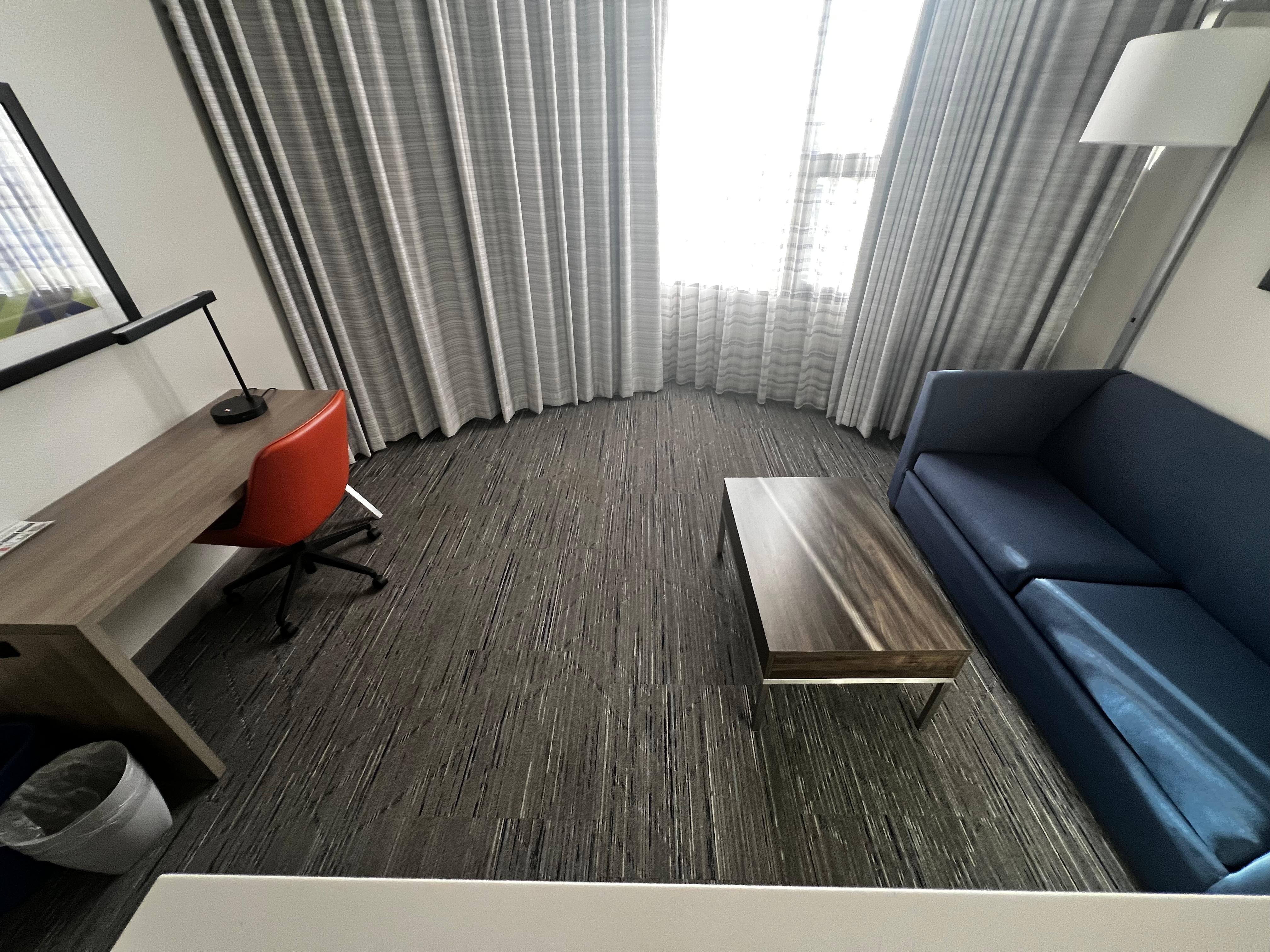 Sitting area with desk and great view.