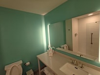 Love the turquoise bathroom.