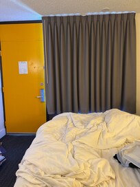 There are only black out curtains. So if you were to open them, the rest of the world can see right into your room.