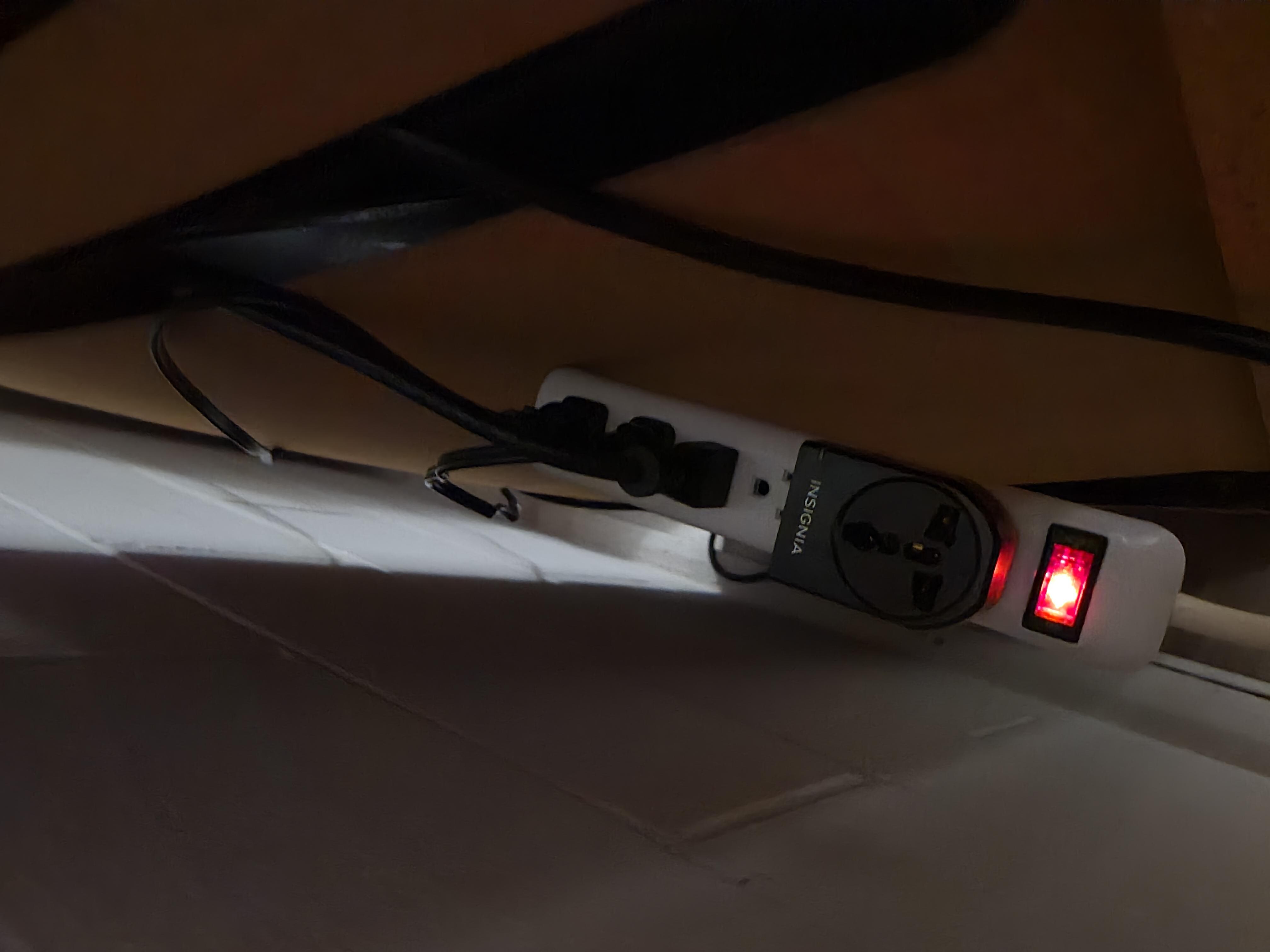 One extension cord. TV, frig and microwave all plugged into it.