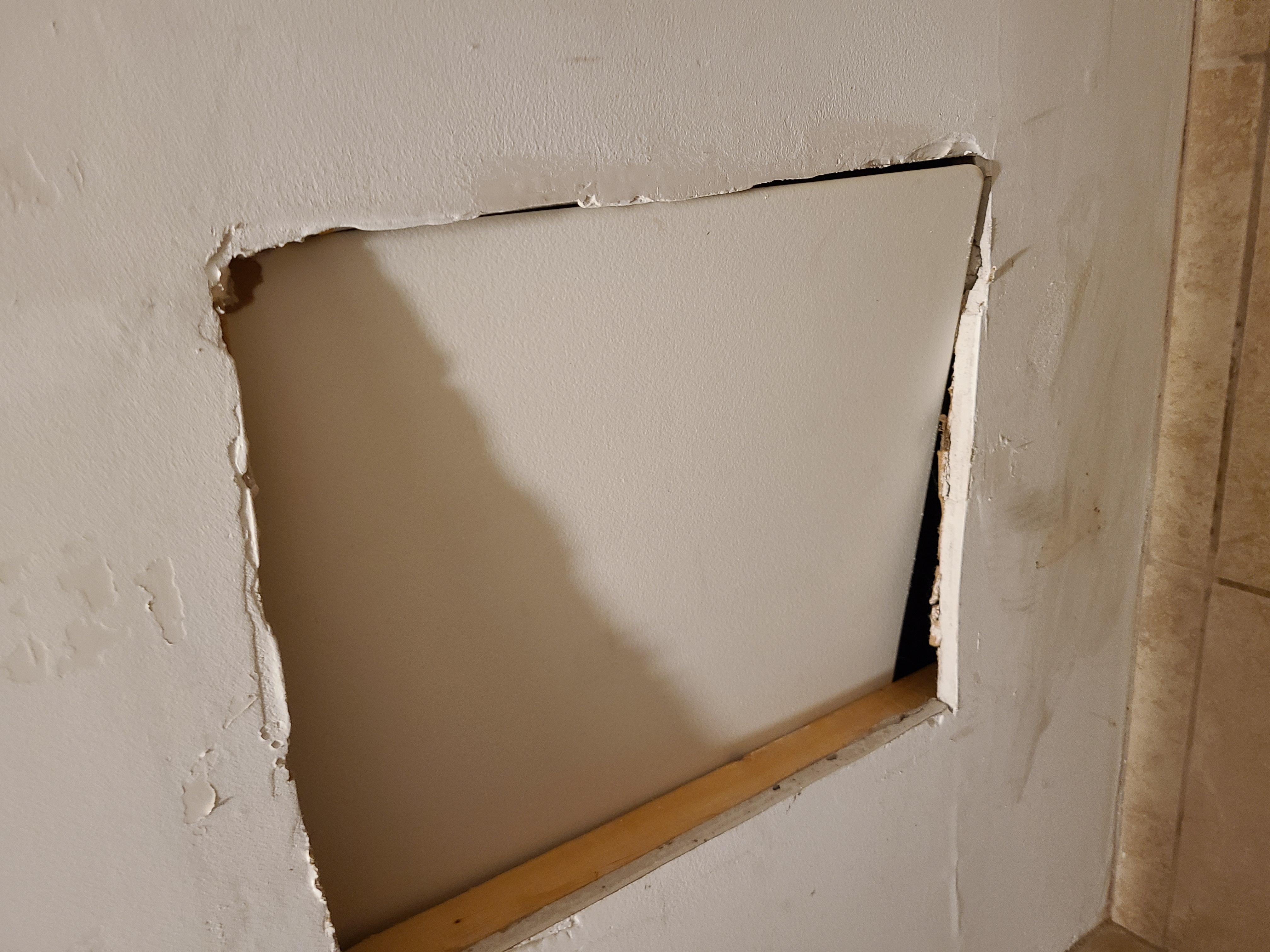 Right over the shower. You can be viewed anywhere in the bathroom!
