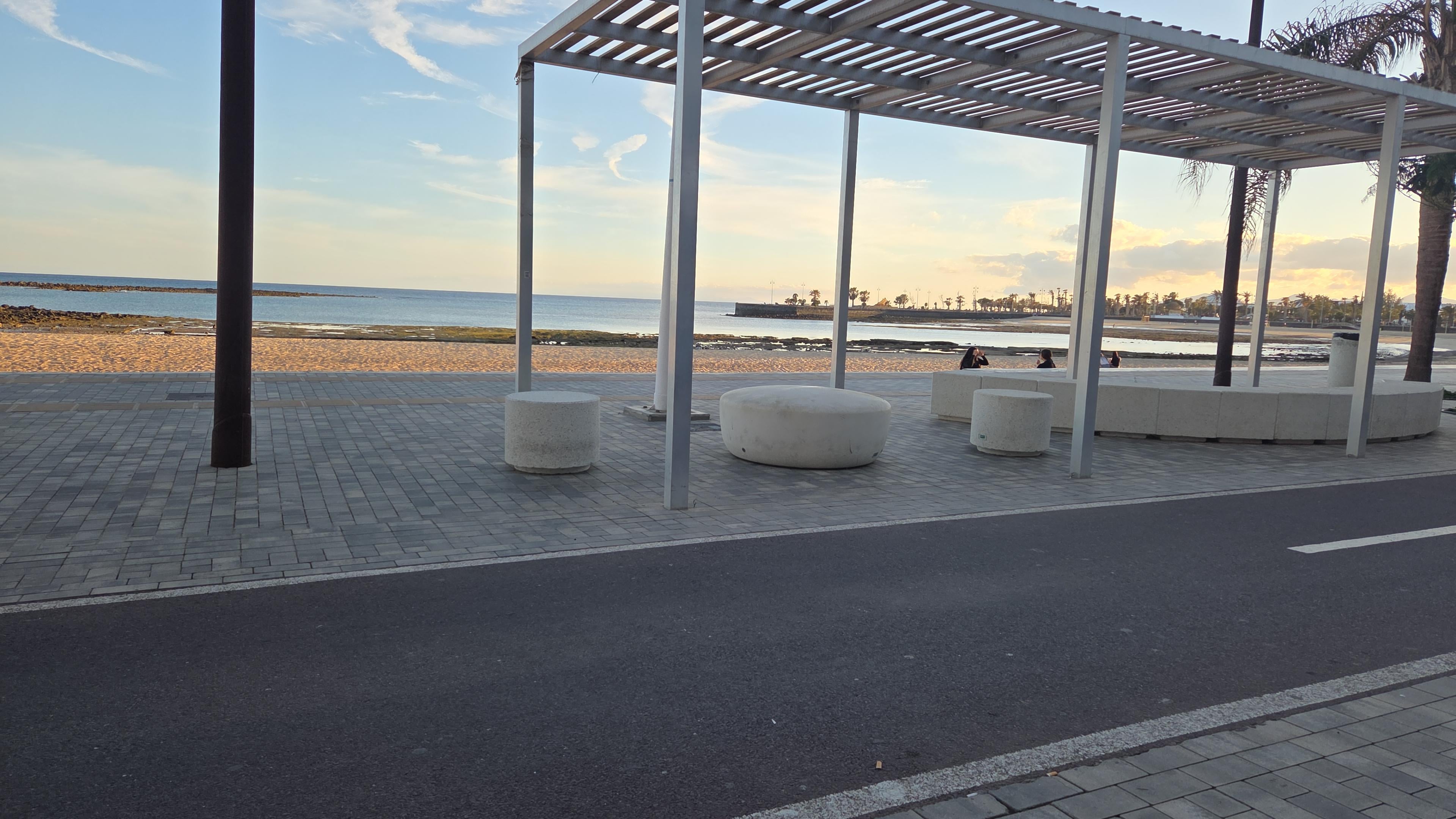 A pedestrian area at the front leading directly to the beach