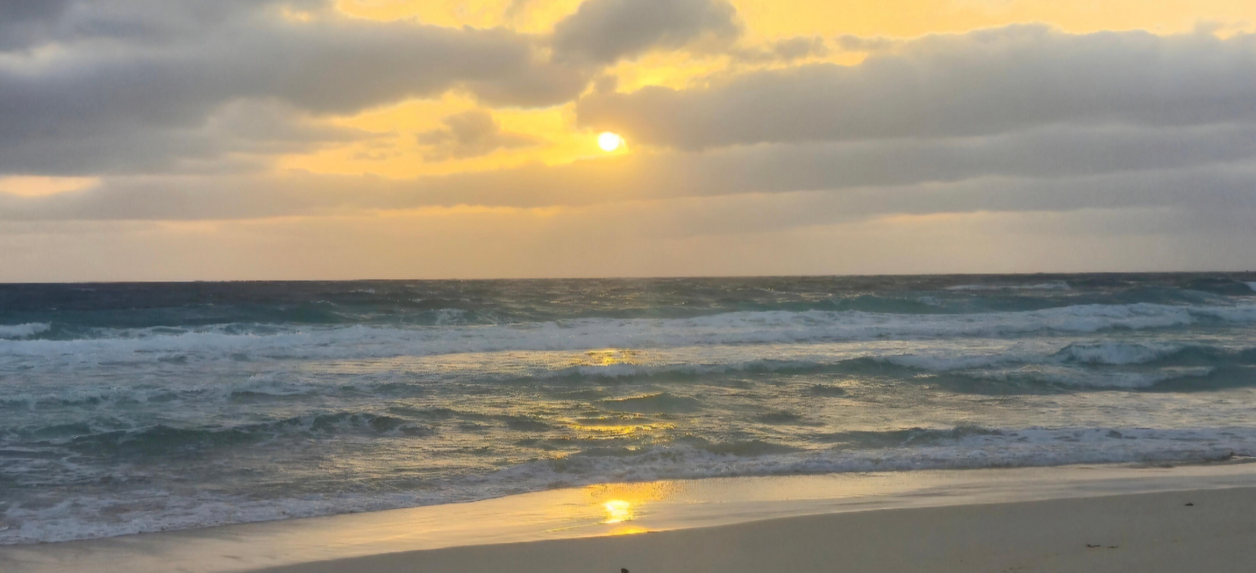 Sunrise on the beach outside the hotel