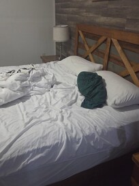 Bed leaned to one side and sunk in middle