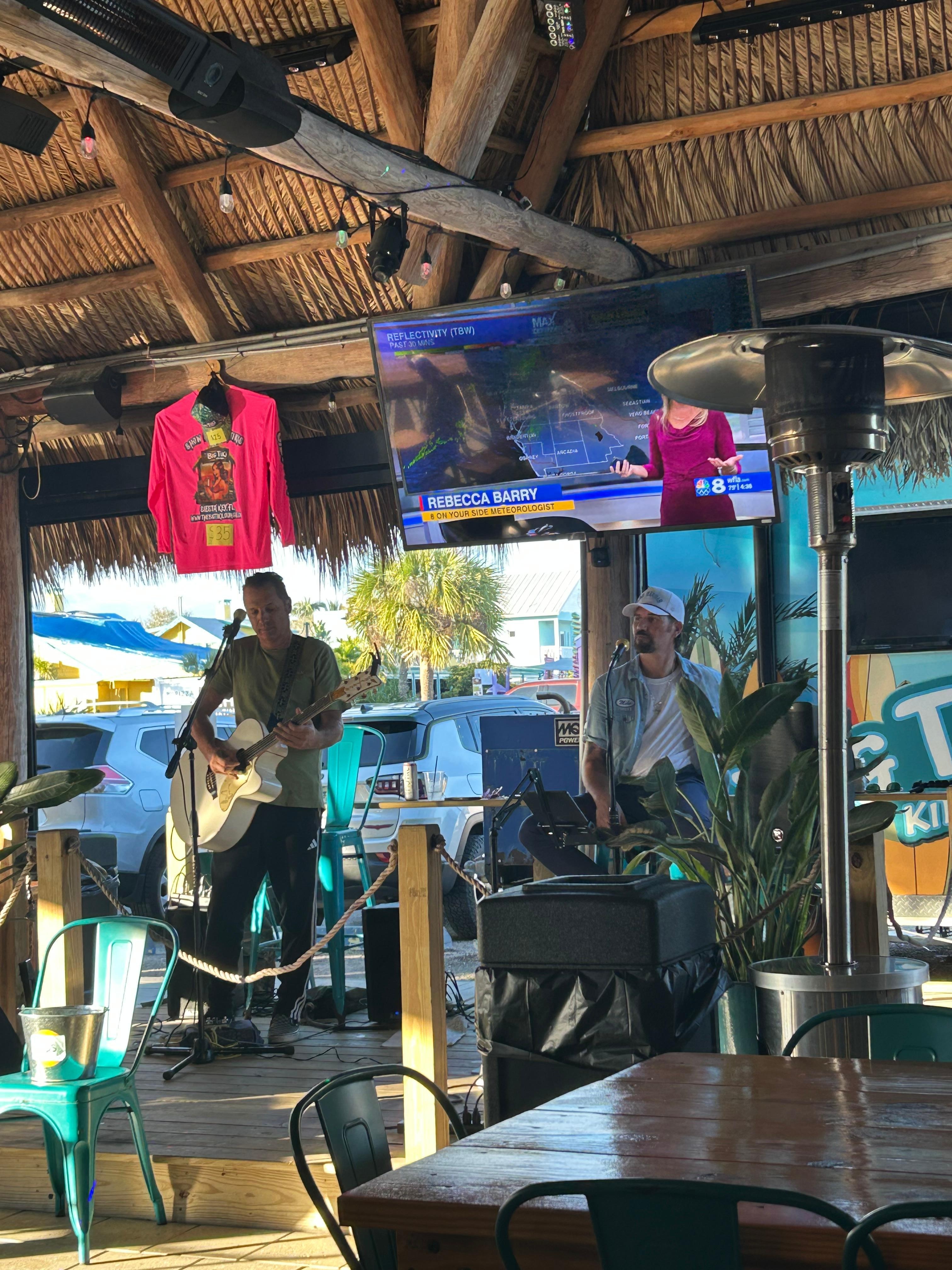 Music during happy hour at Tiki Bar associated with hotel 