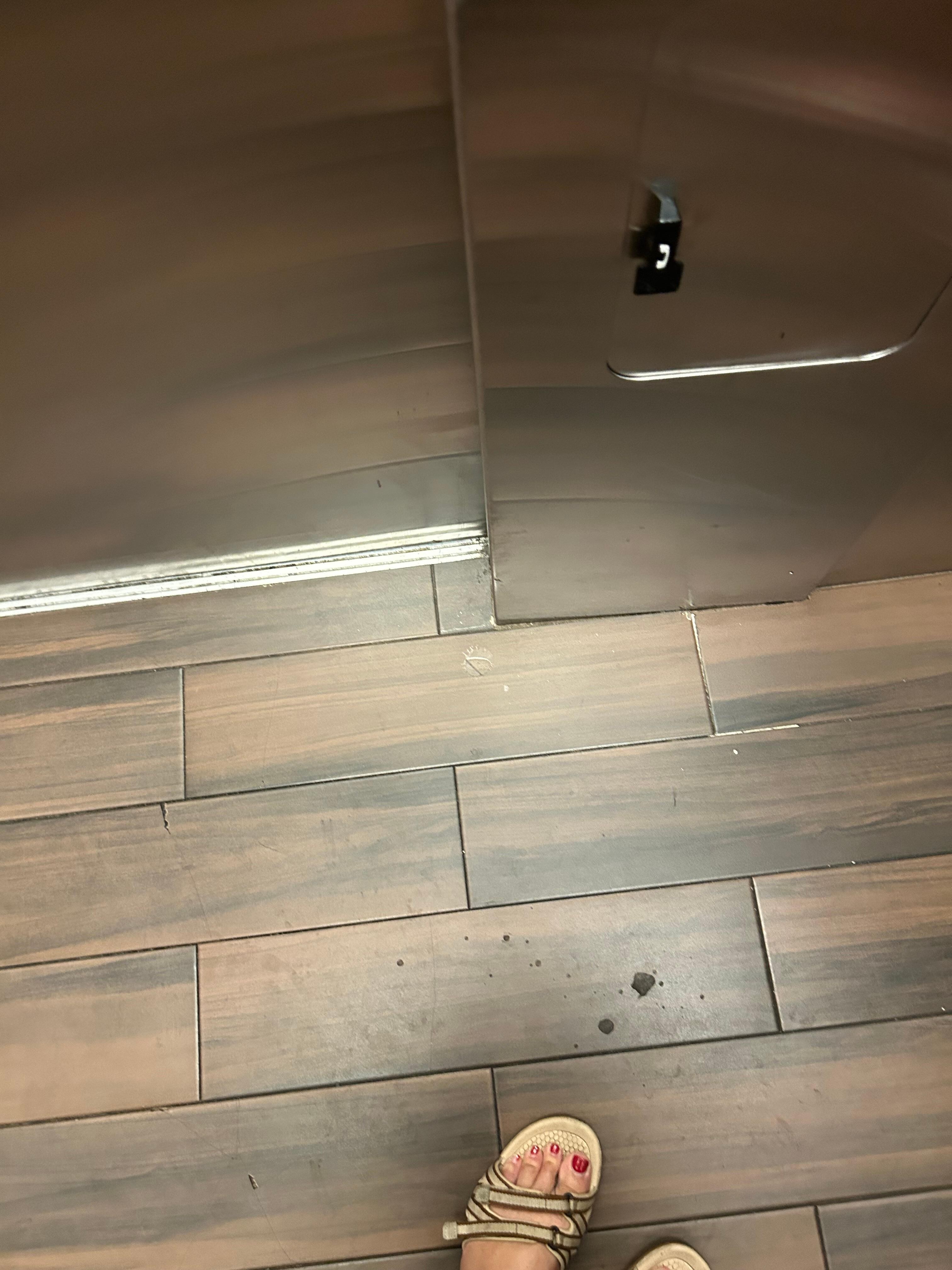 Substance on elevator floor