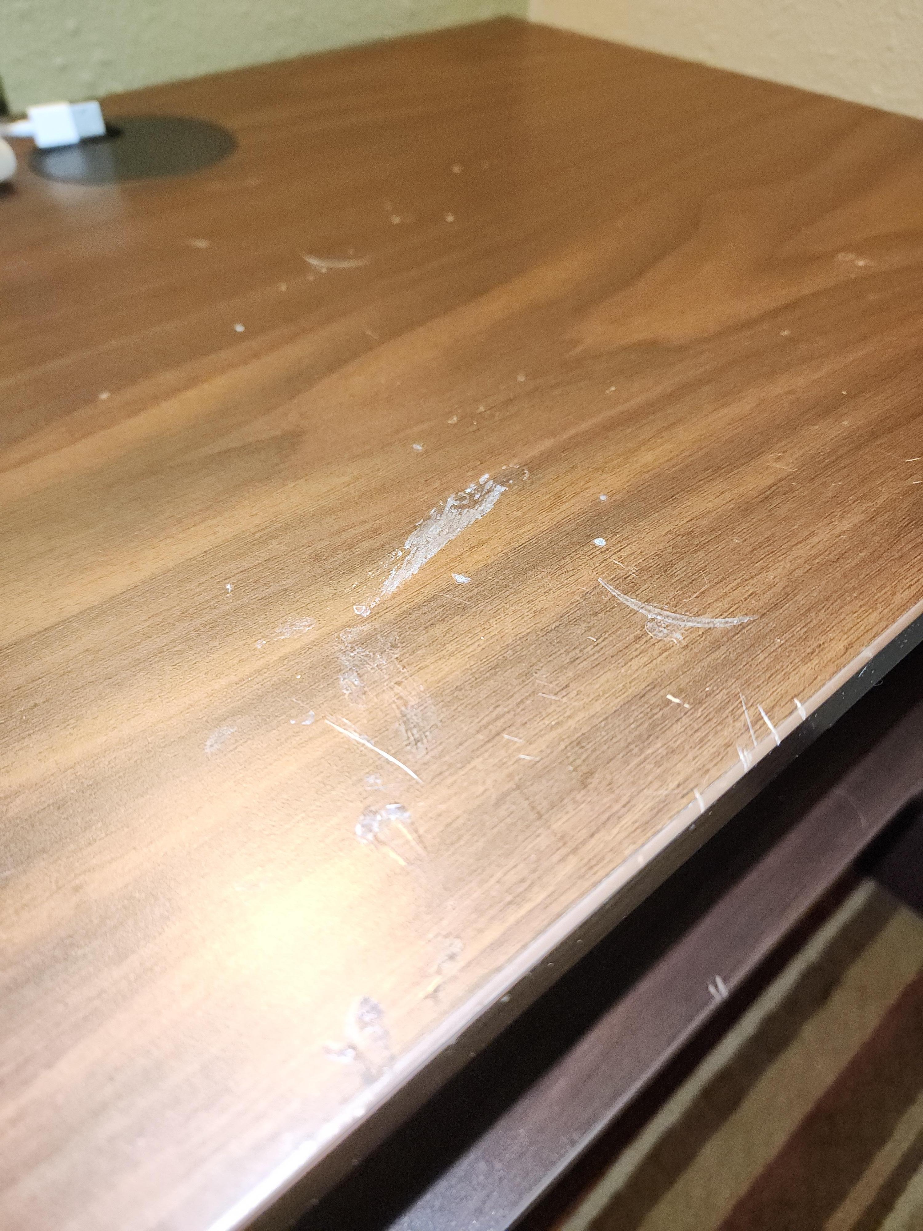 Gross stains on table by bed.